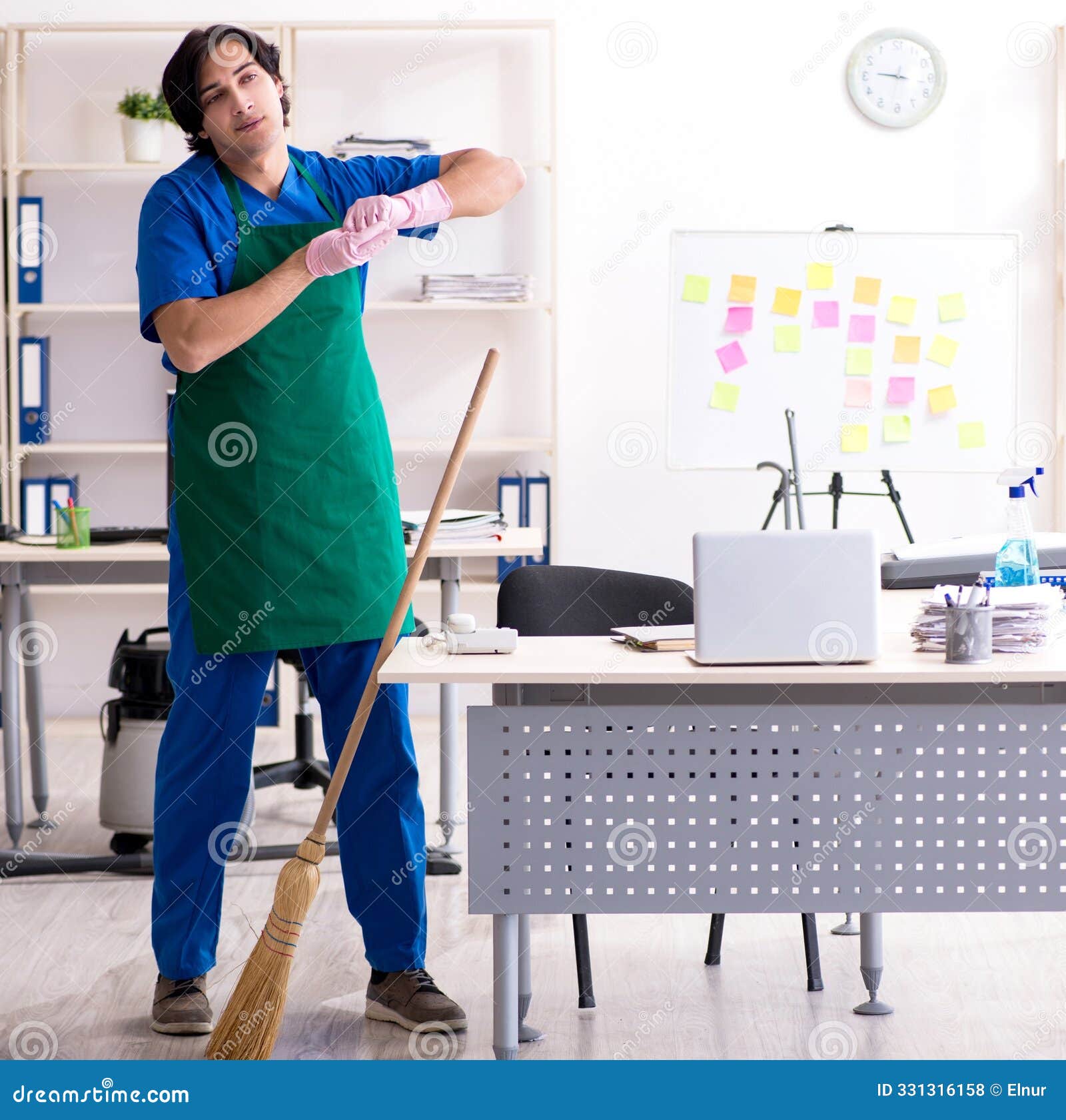 Male Handsome Professional Cleaner Working in the Office Stock Photo ...