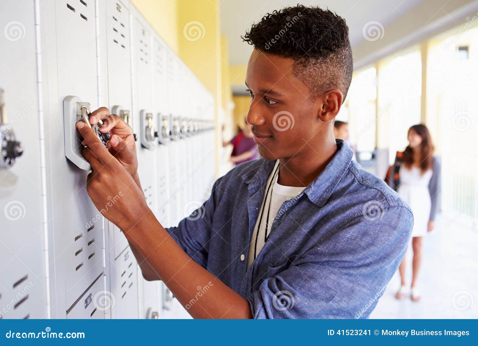 Male High School Student Opening Locker Stock Image - Image of lock ...