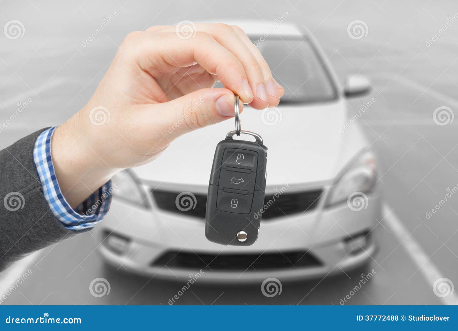 Male Holding Car Keys with Remote Control System Stock Photo - Image of ...
