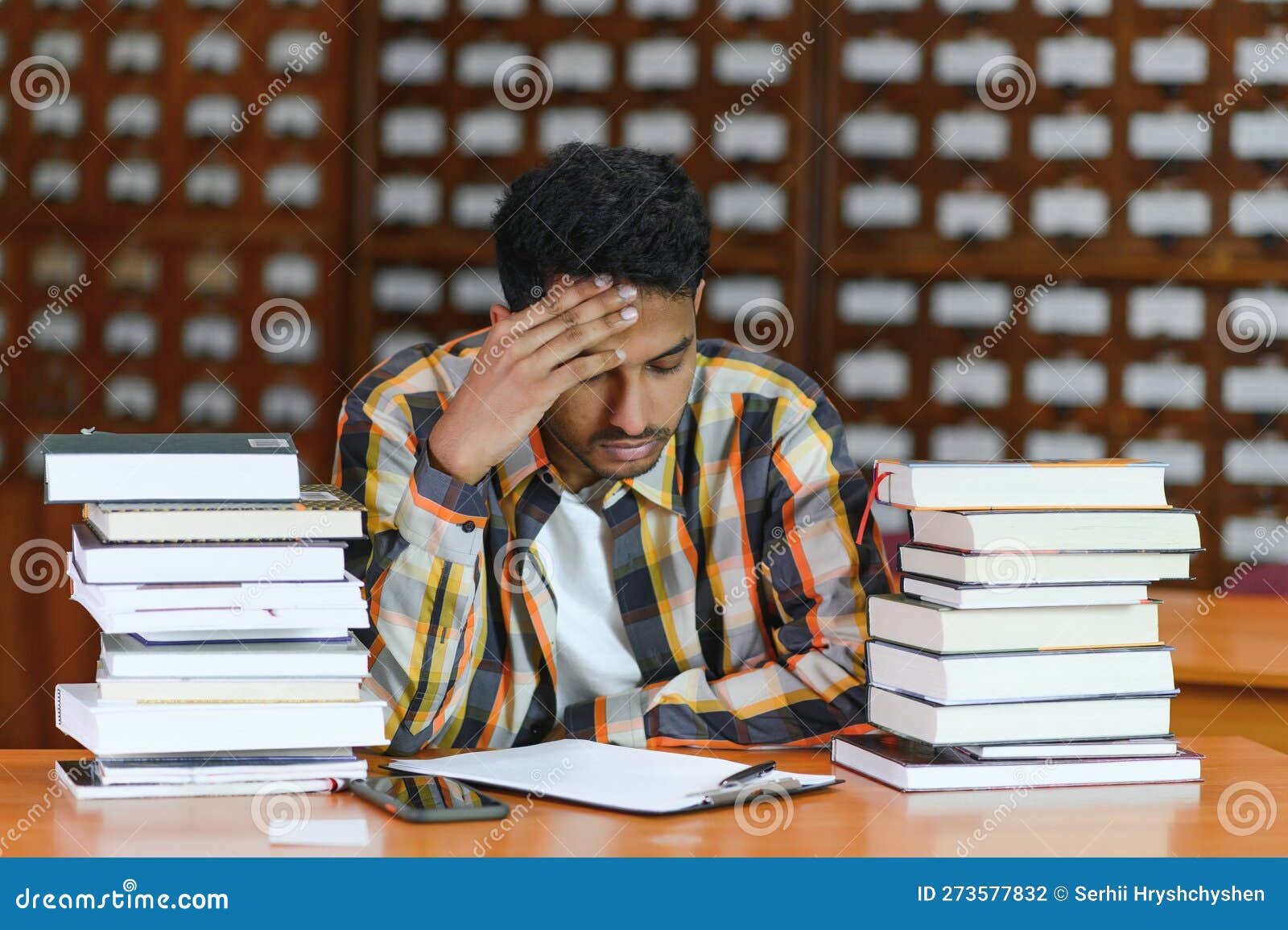 Male Indian Student at the Library with Book Stock Photo - Image of ...