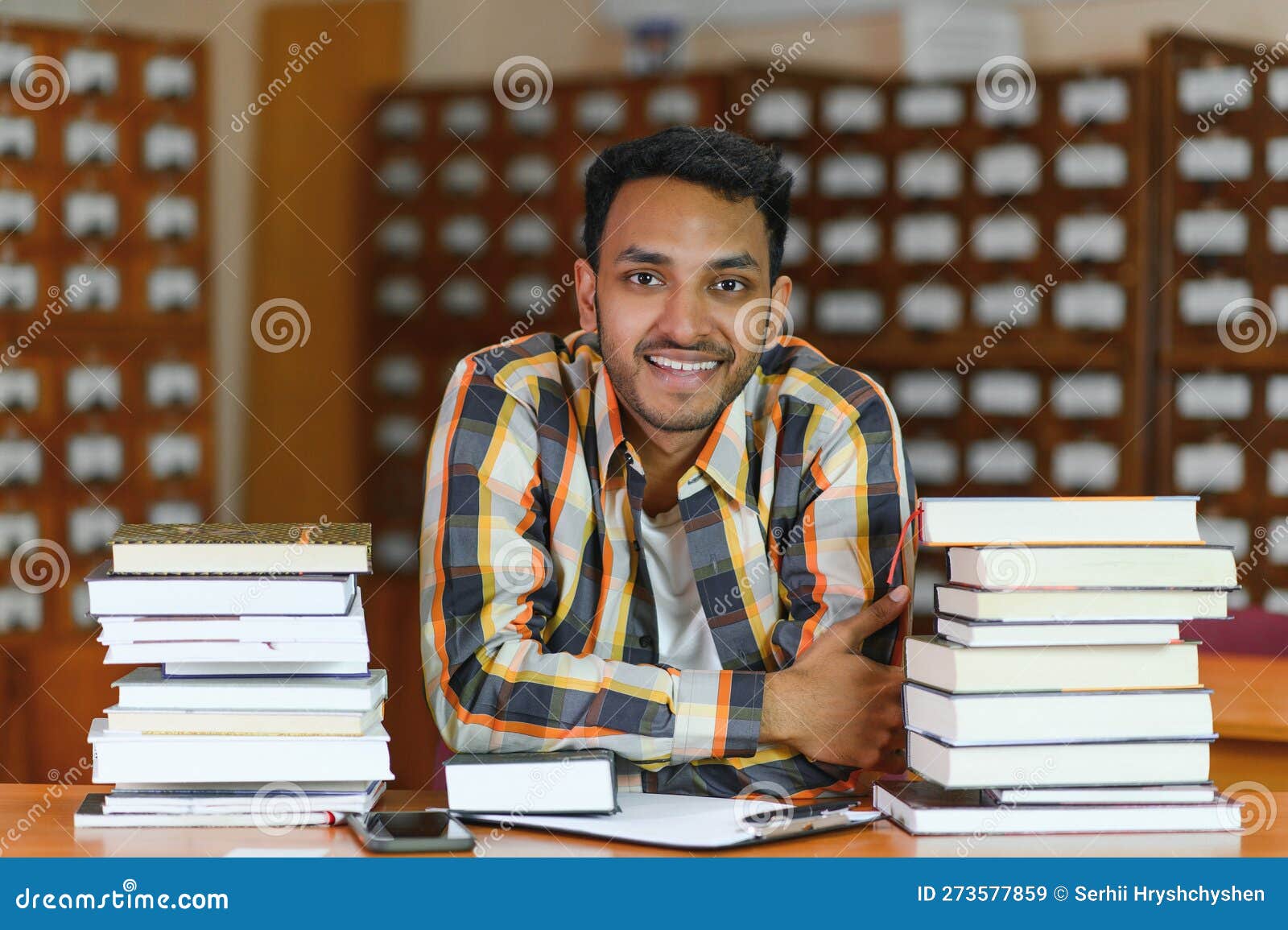 Male Indian Student at the Library with Book Stock Image - Image of ...