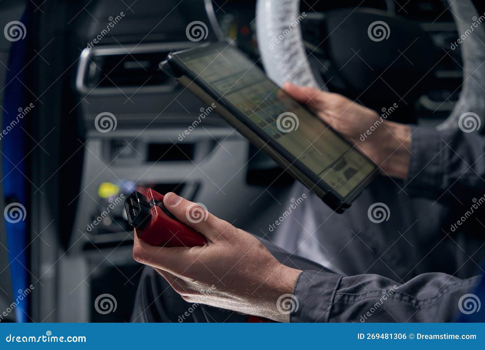 Male Inspecting Board Computer System in the Workshop Stock Photo ...