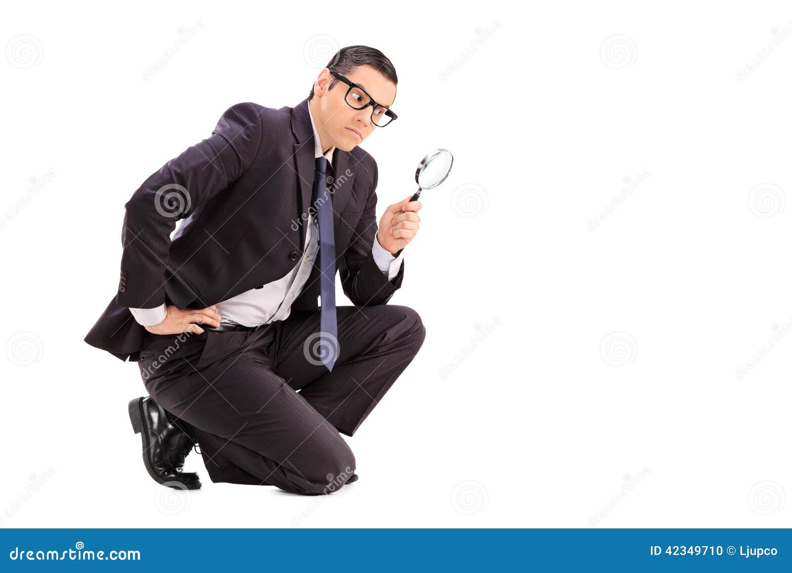 Male Inspector Looking through a Magnifying Glass Stock Photo - Image ...