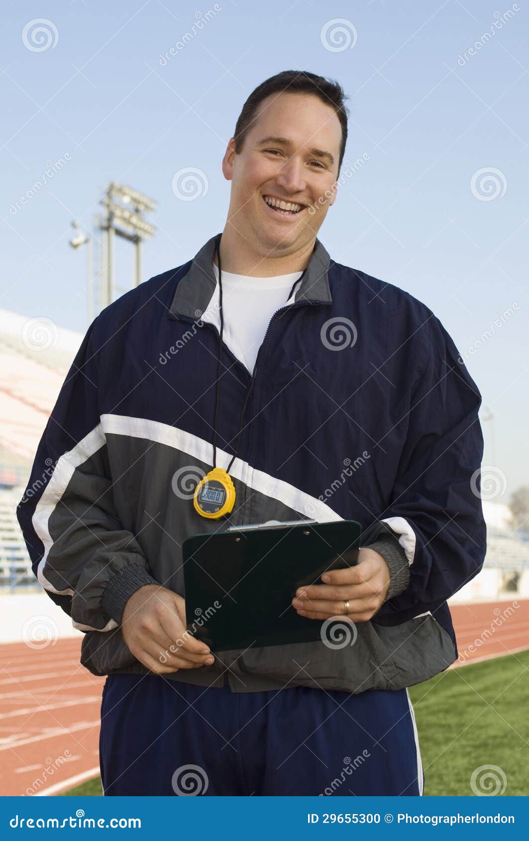 Male Instructor Holding Clipboard Stock Photo - Image of instructor ...