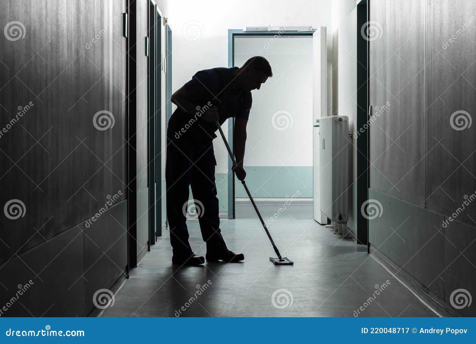 Male Janitor Cleaning Corridor Stock Image - Image of housework, adult ...