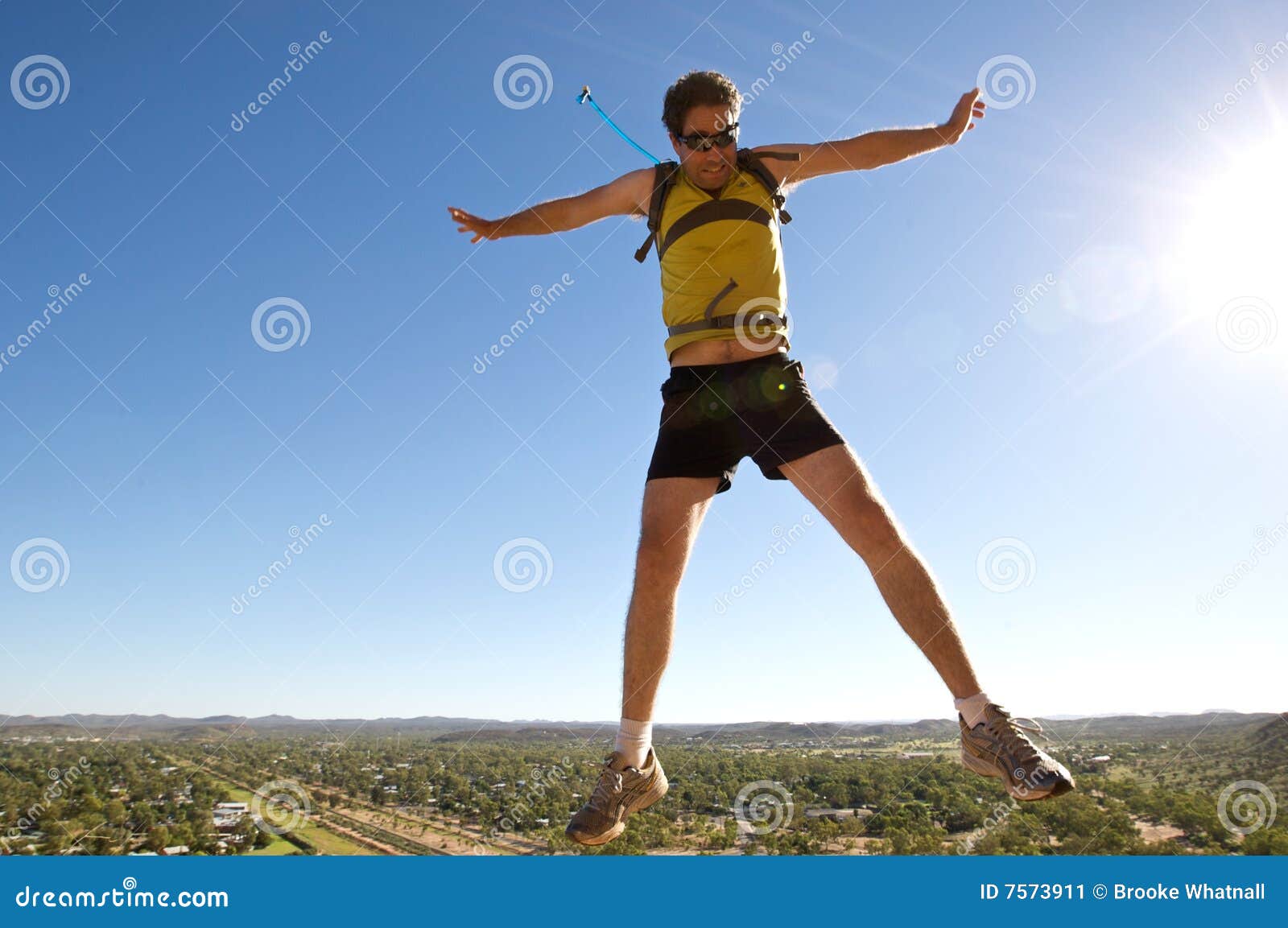 Male Jumping Infront of Vista Stock Image - Image of mountain, look ...