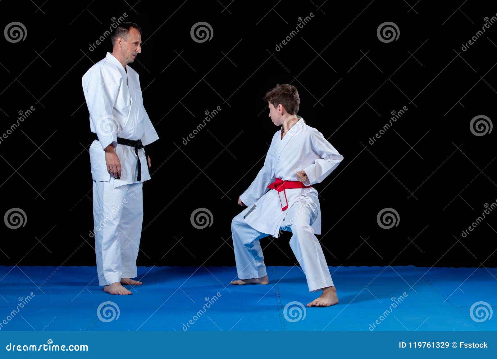 Male Karate Instructor Training Little Children in Dojo Stock Image ...