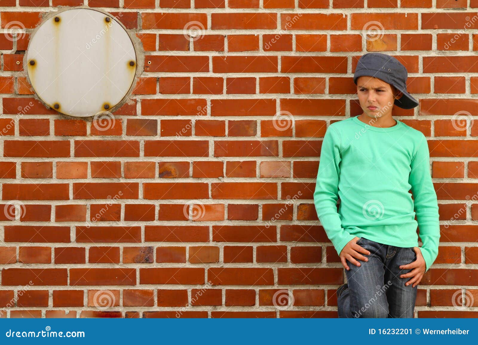 Male Kid Standing on a Brick Stone Wall Stock Image - Image of shirt ...