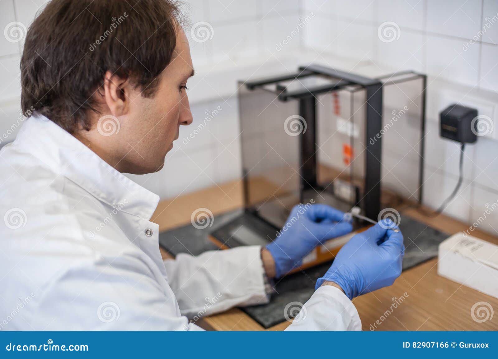 Male Laboratory Researcher Performs Tests Stock Photo - Image of ...