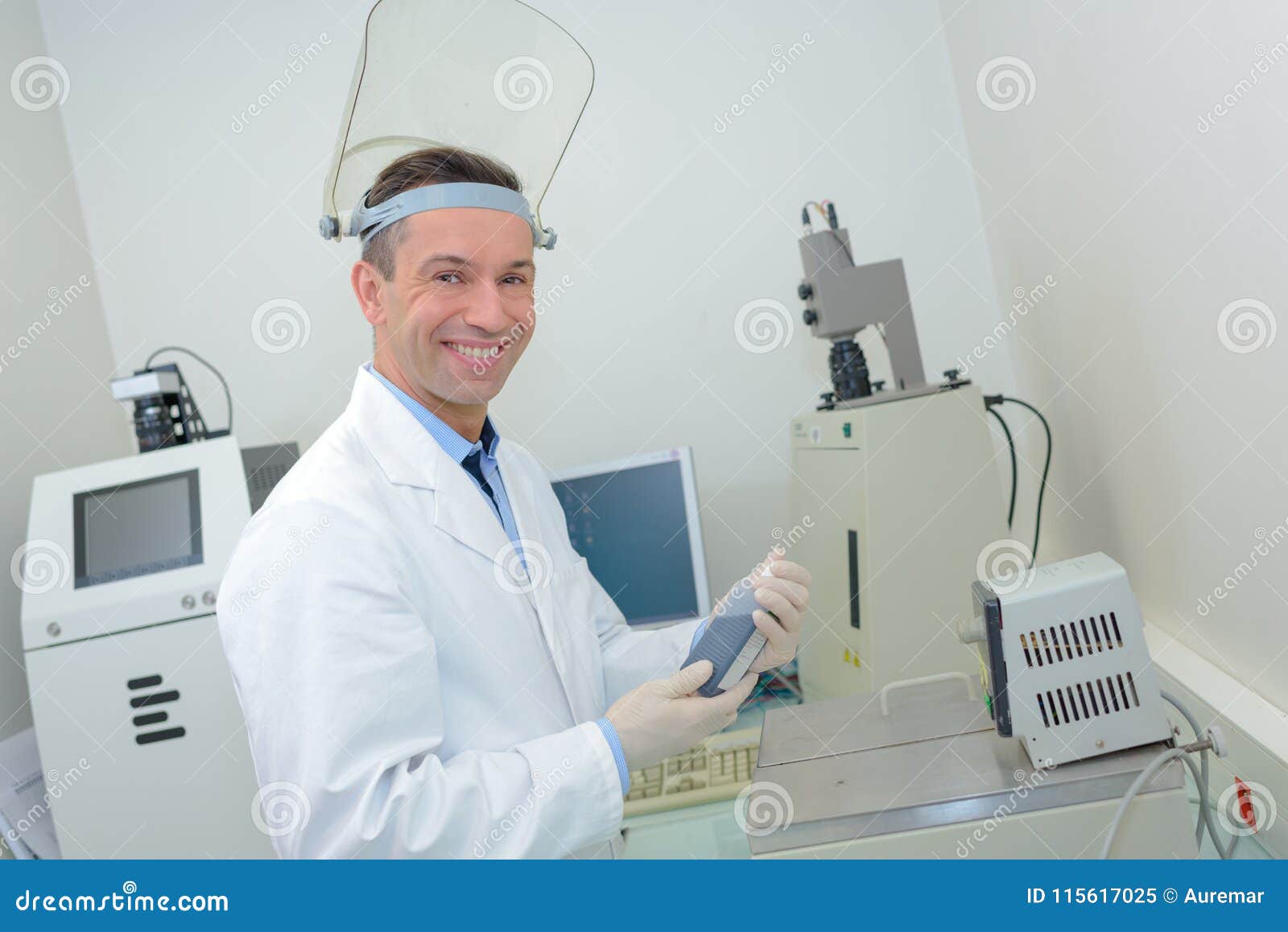 Male Laboratory Technician Wearing Visor Stock Image - Image of health ...