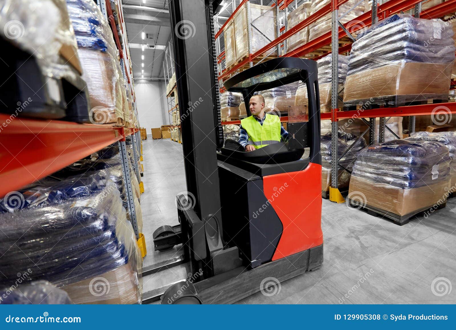 Male Loader Operating Forklift at Warehouse Stock Photo - Image of ...