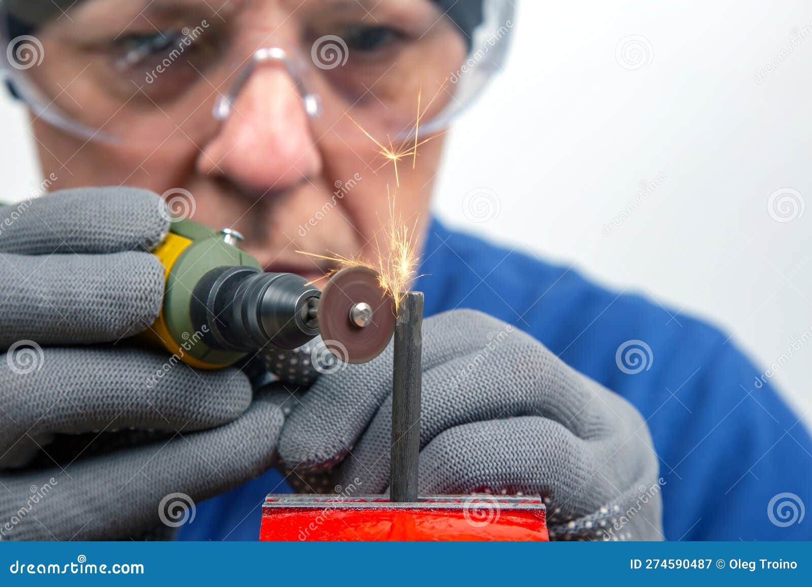 Male Locksmith Worker Processes Metal with Engraving Drill Stock Image ...