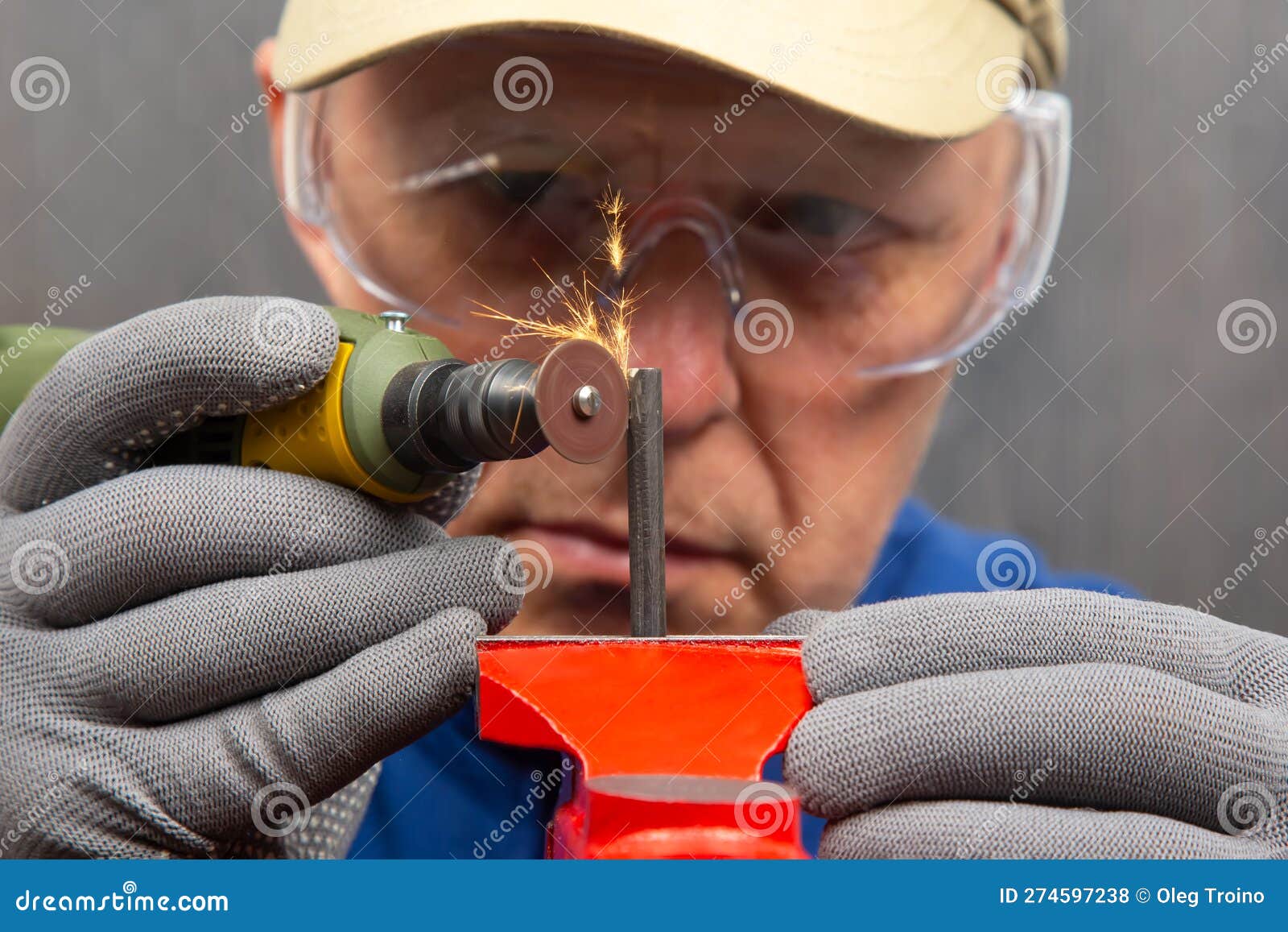 Male Locksmith Worker Processes Metal with Engraving Drill Stock Photo ...