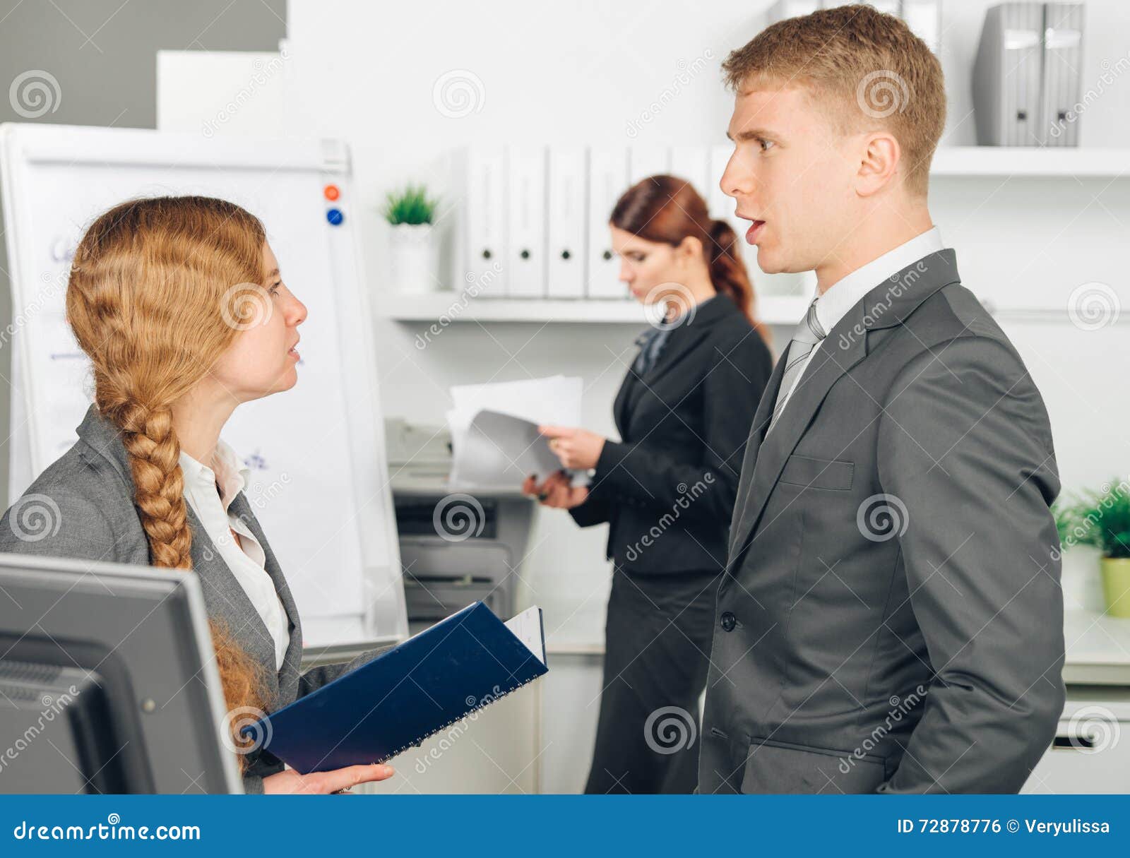 Male Manager Instructs Female Employee Stock Photo - Image of suit ...