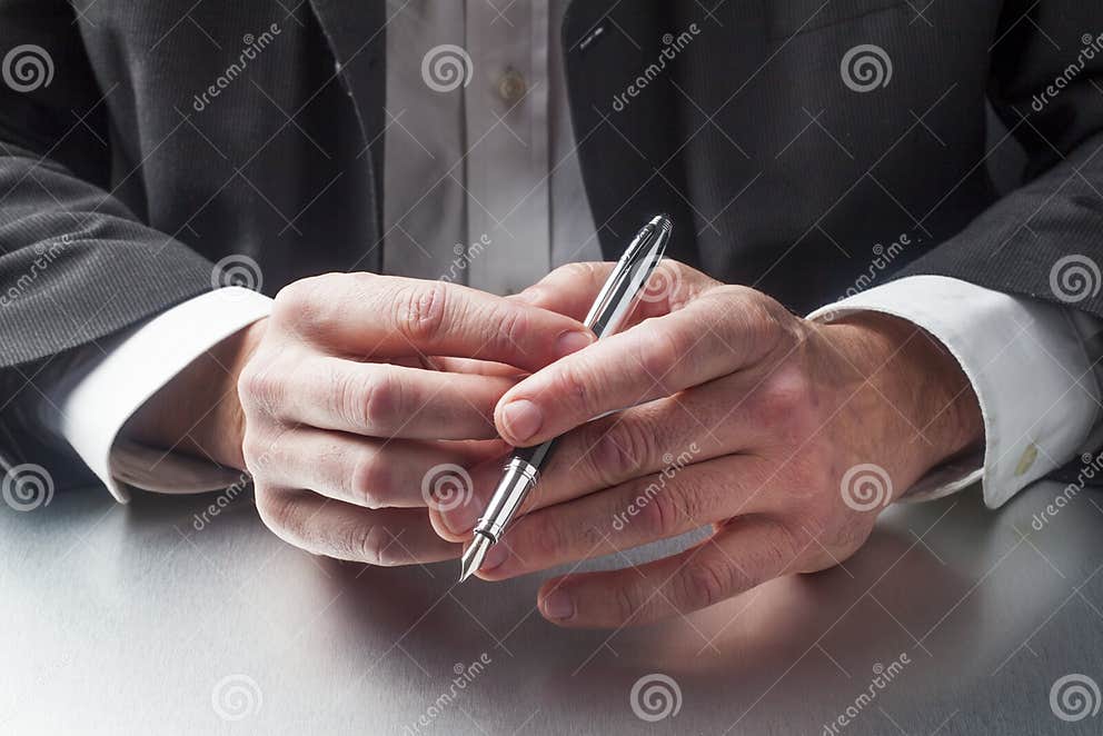 Male Manager with Pen in His Hands at Work Stock Image - Image of ...