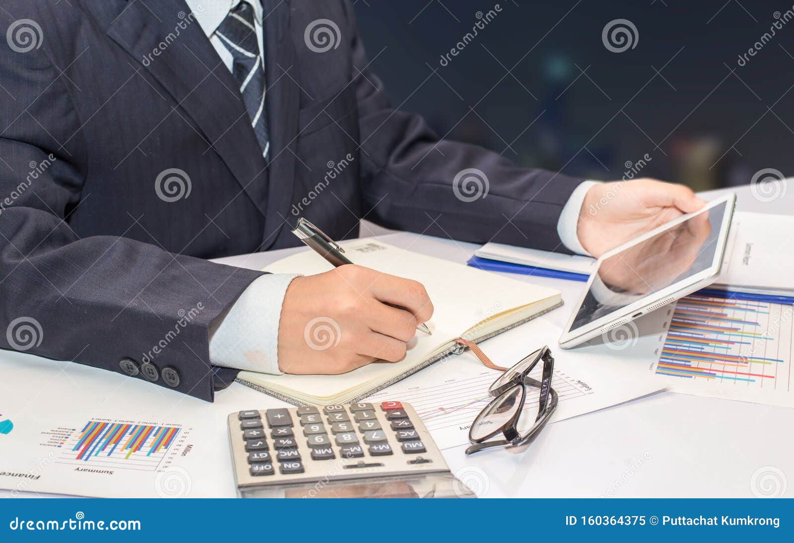 Male Manager Putting His Ideas and Writing Business Plan at Workplace ...