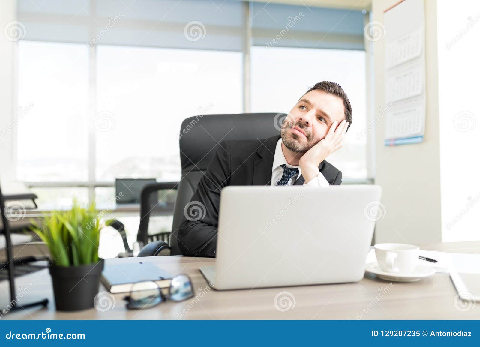 Male Manager Waiting for the End of Work Day Stock Image - Image of ...