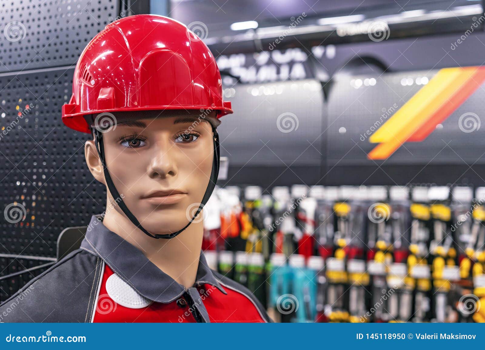 Male Mannequin in a Protective Helmet and Work Clothes Stock Photo ...
