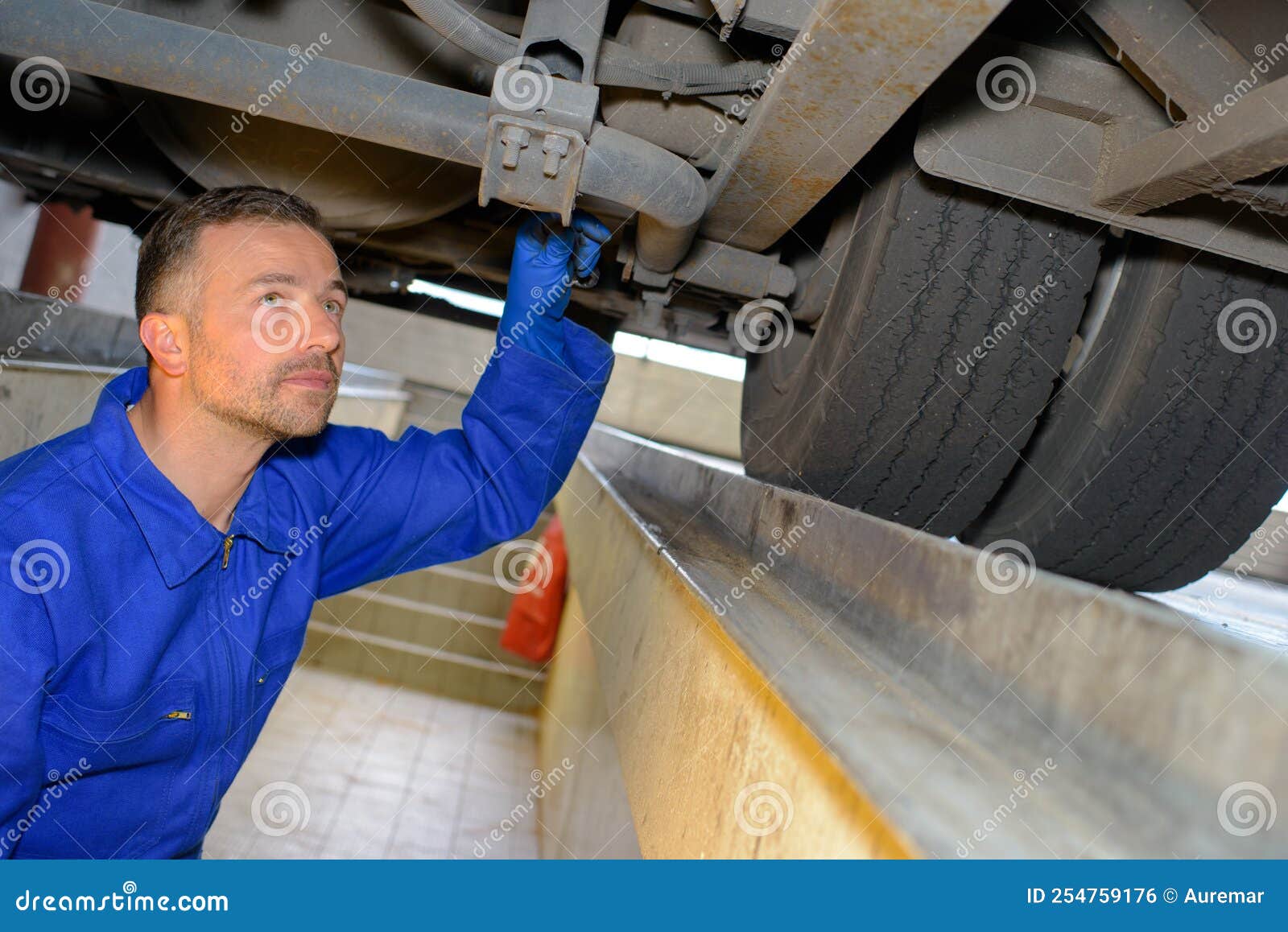 Male Mechanic Fixing Vehicle Stock Photo - Image of replace, procedure ...