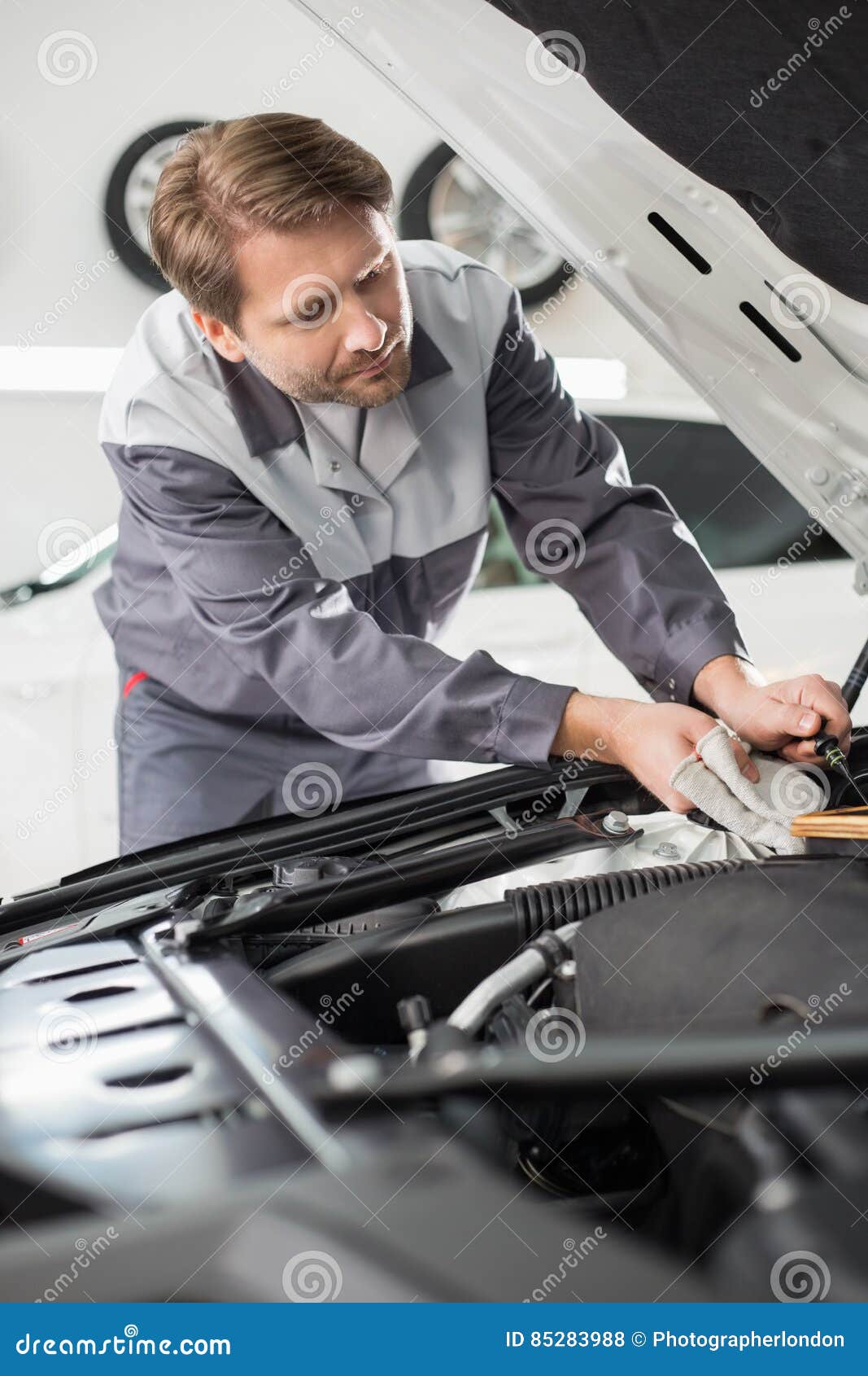 Male Mechanic Repairing Car Engine in Workshop Stock Photo - Image of ...