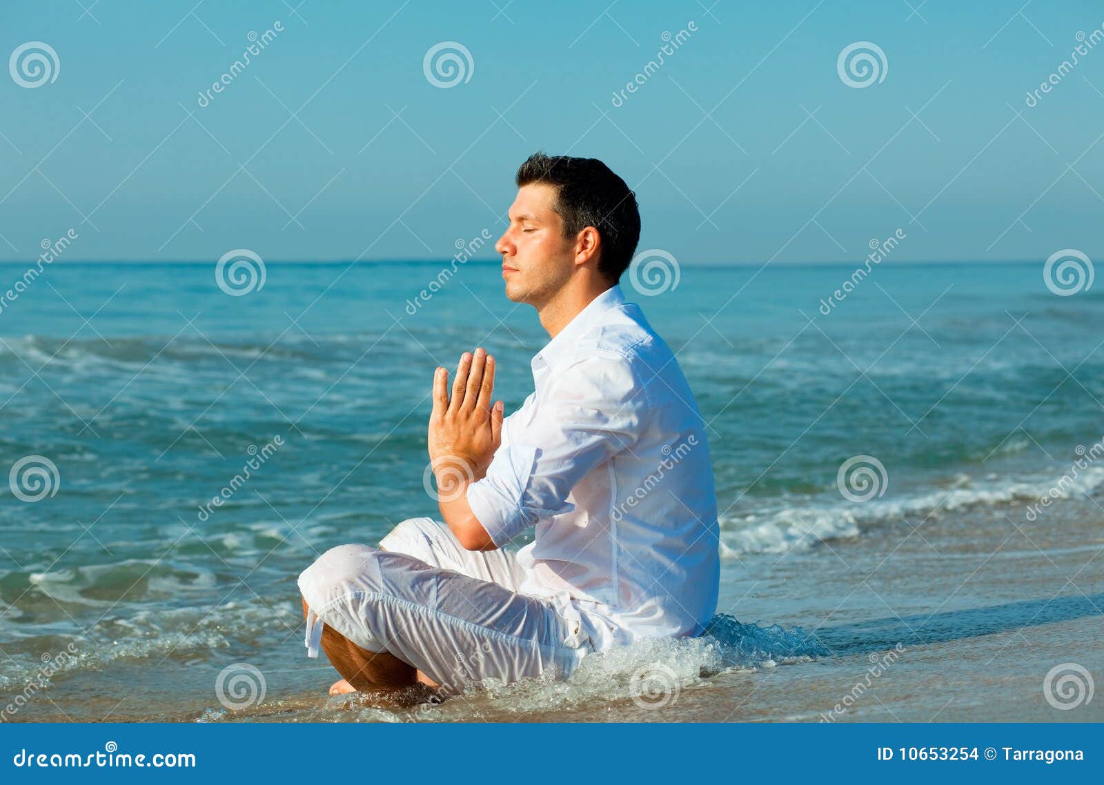 Male mediation beach stock photo. Image of ocean, beautiful - 10653254