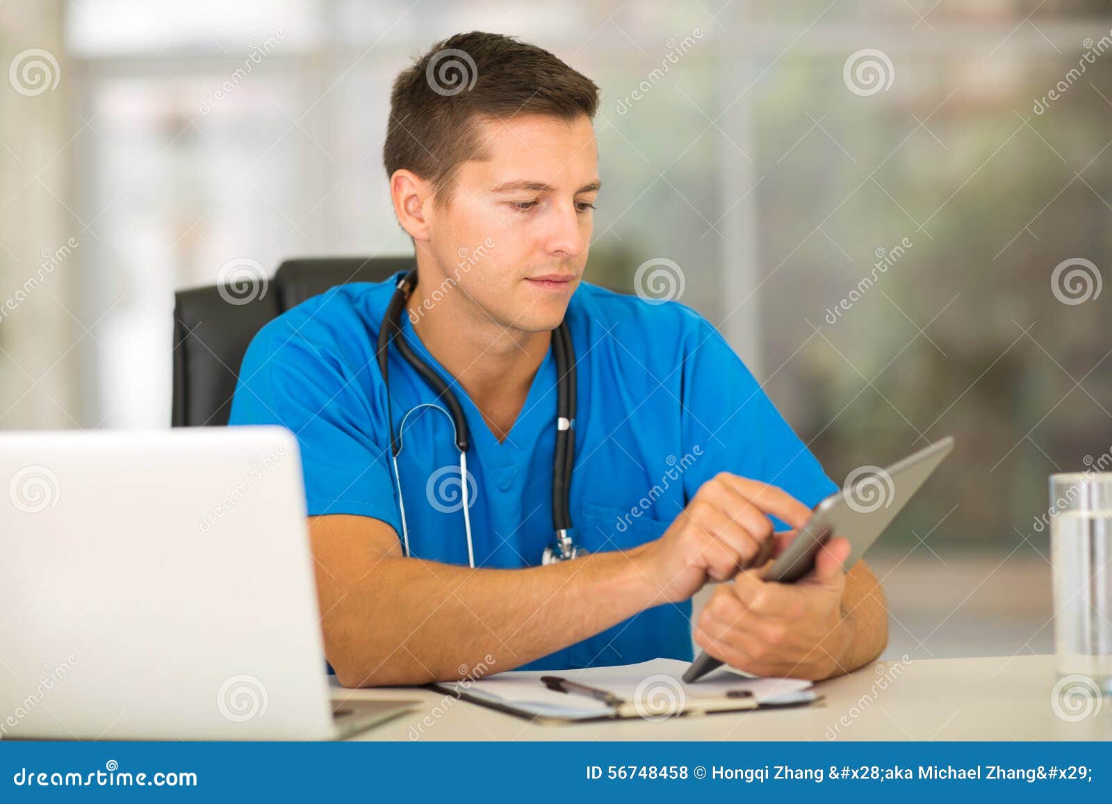 Male medical intern stock photo. Image of desk, employee - 56748458