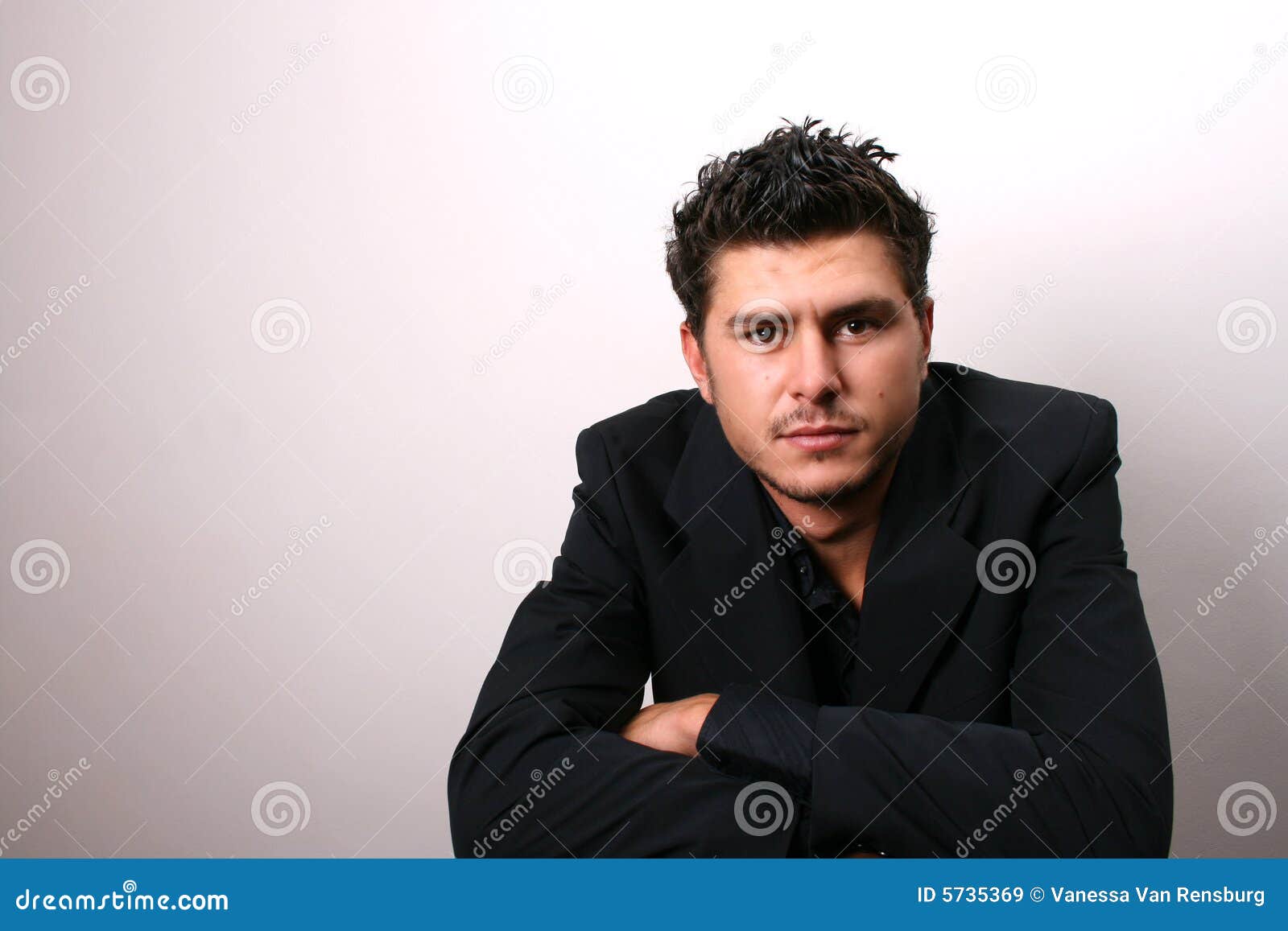 Male Model in Dark Lighting Stock Image - Image of tanned, suit: 5735369
