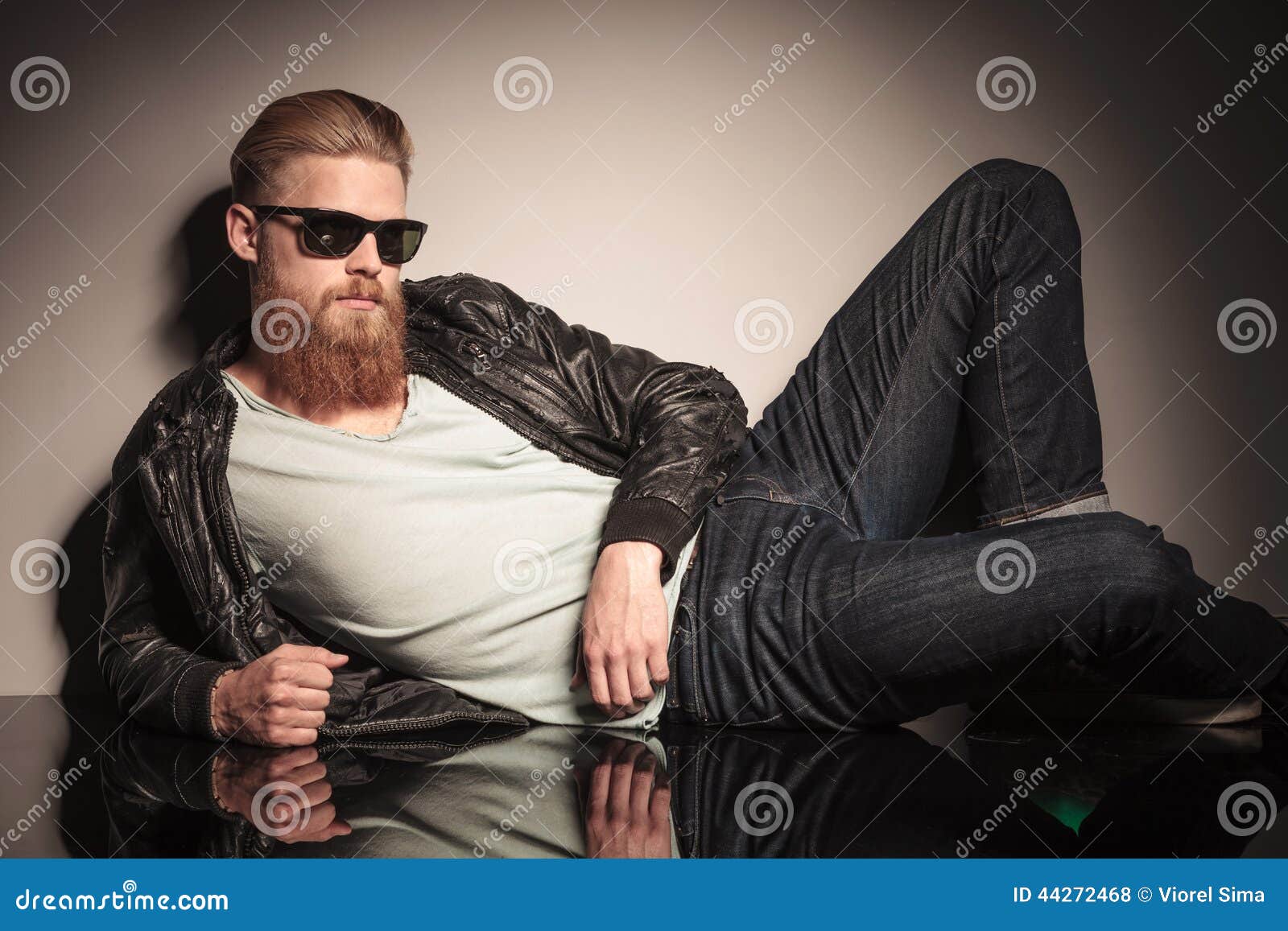 Male Model on the Floor Looking at the Camera Stock Photo - Image of ...