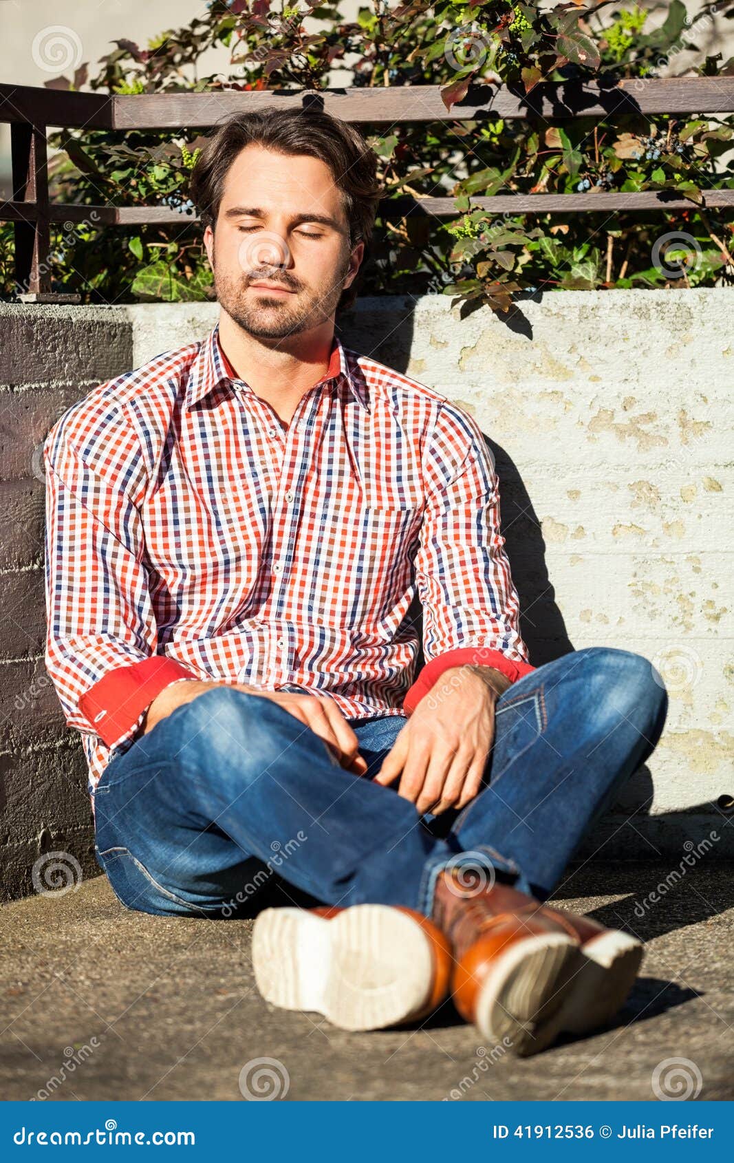 Male Model Leaning Against Wall Stock Photo - Image of confident ...