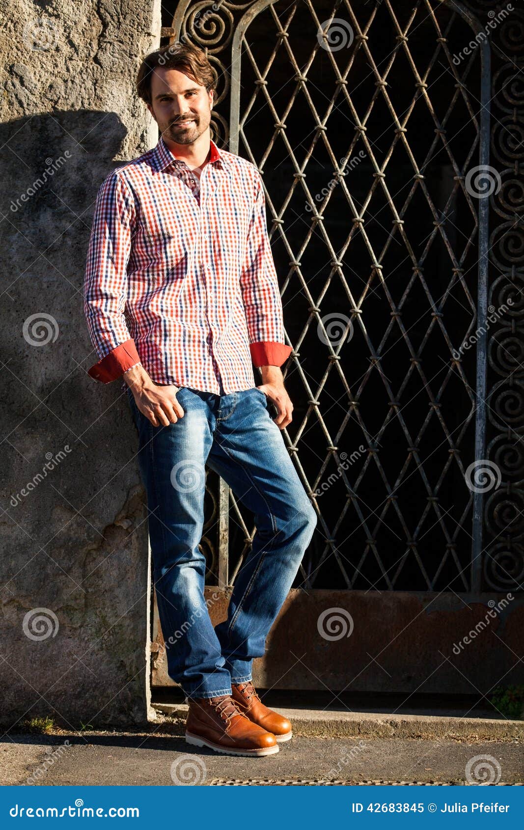 Male Model Leaning Against Wall Stock Image - Image of handsome, suave ...