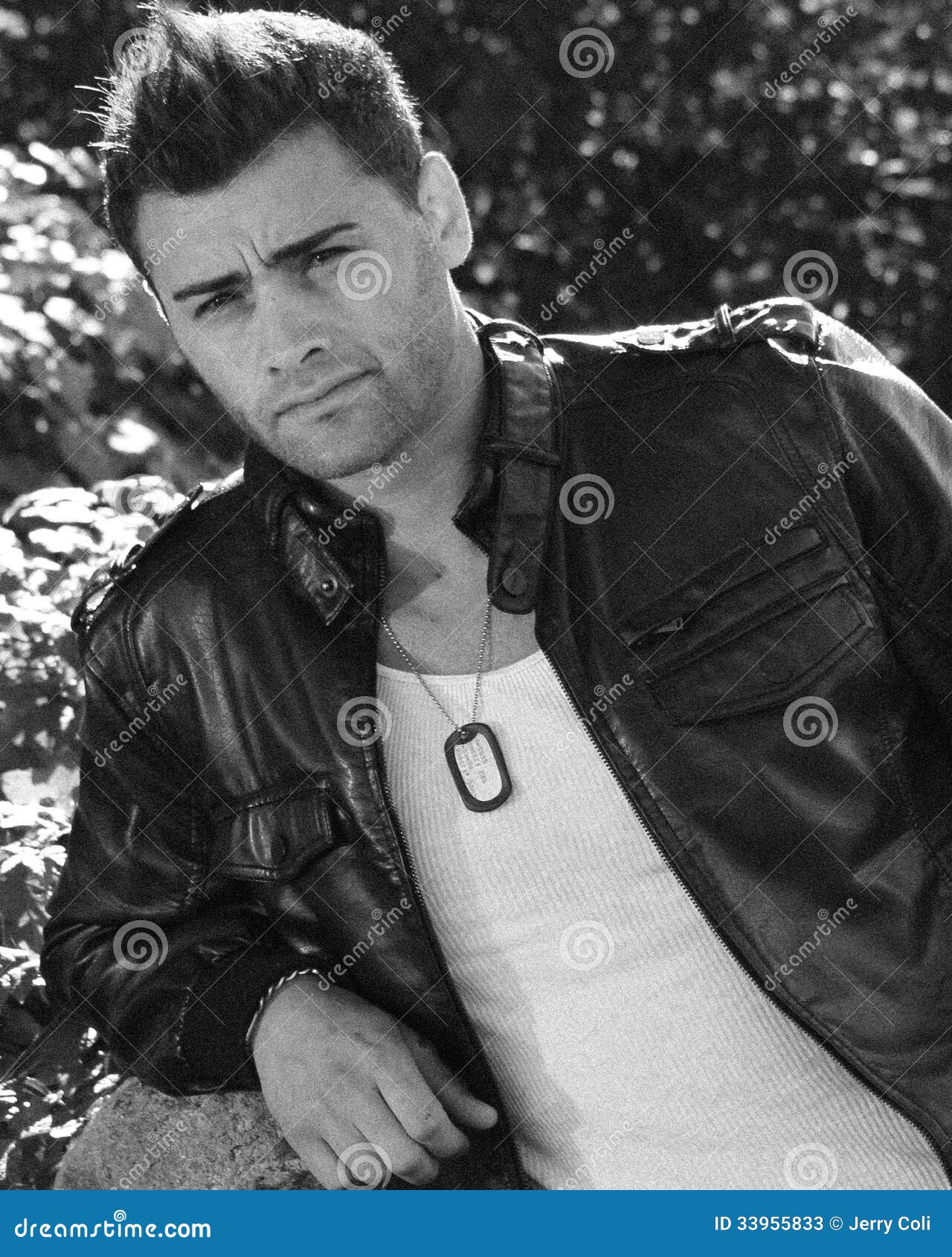 Male Model Leaning on a Stone Wall. Stock Image - Image of leaning ...