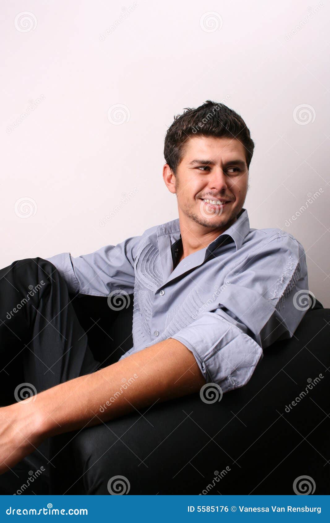 Male Model Looking Over His Shoulder Stock Photo - Image of dark, copy ...