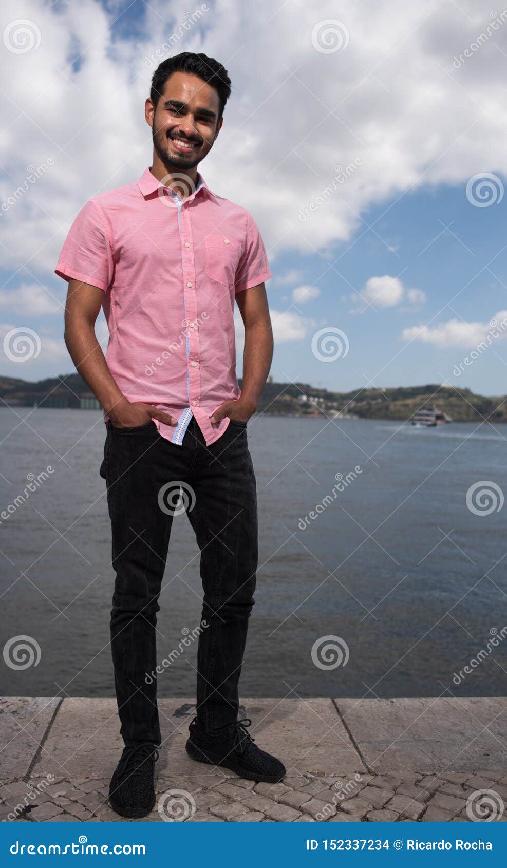 Male Model Posing in Font of River Stock Photo - Image of blue, travel ...