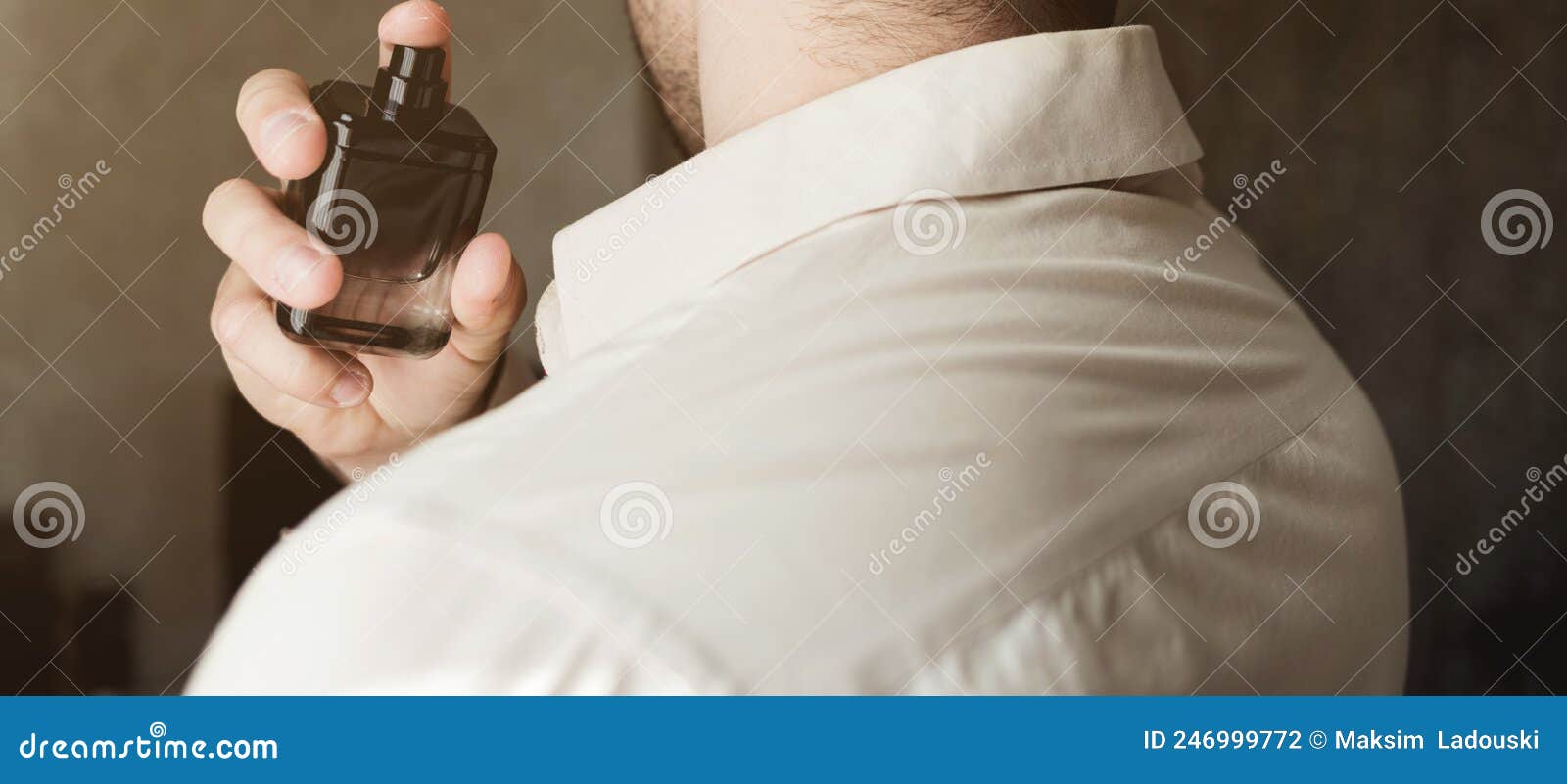Male model using perfume stock photo. Image of caucasian - 246999772