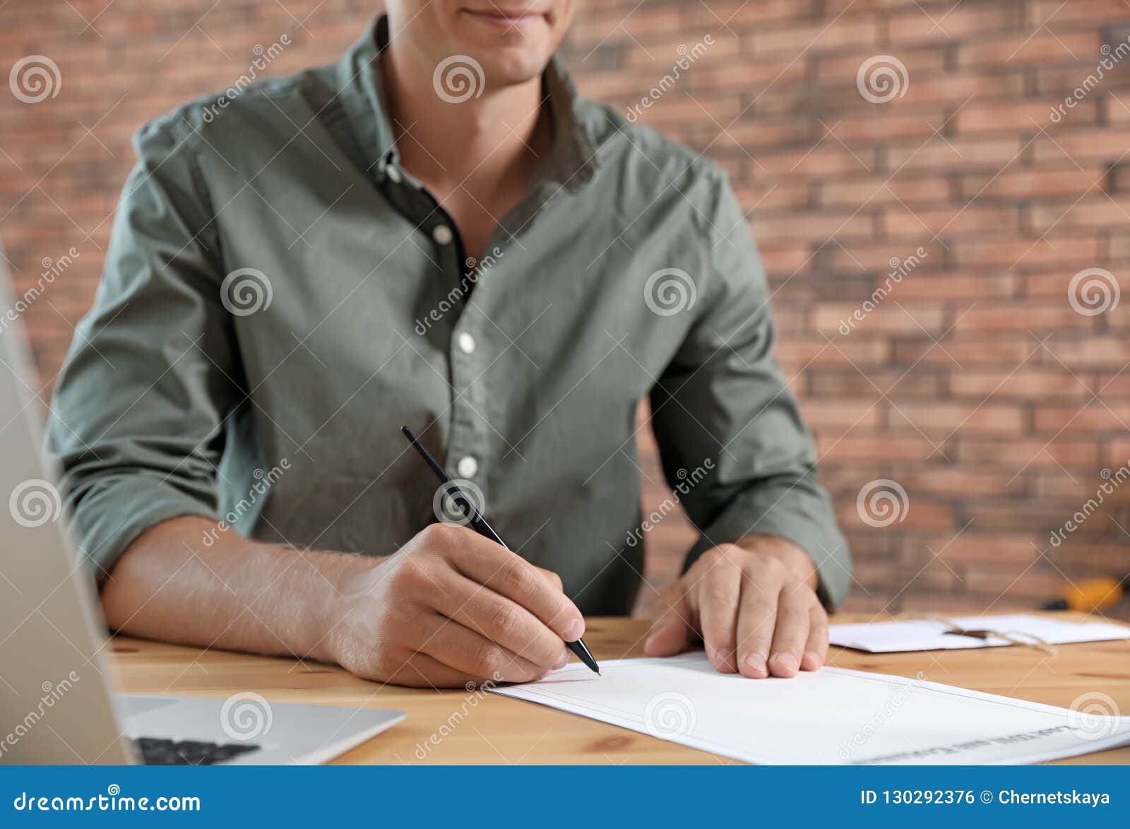 Male Notary Signing Document at Table in Offic Stock Photo - Image of ...
