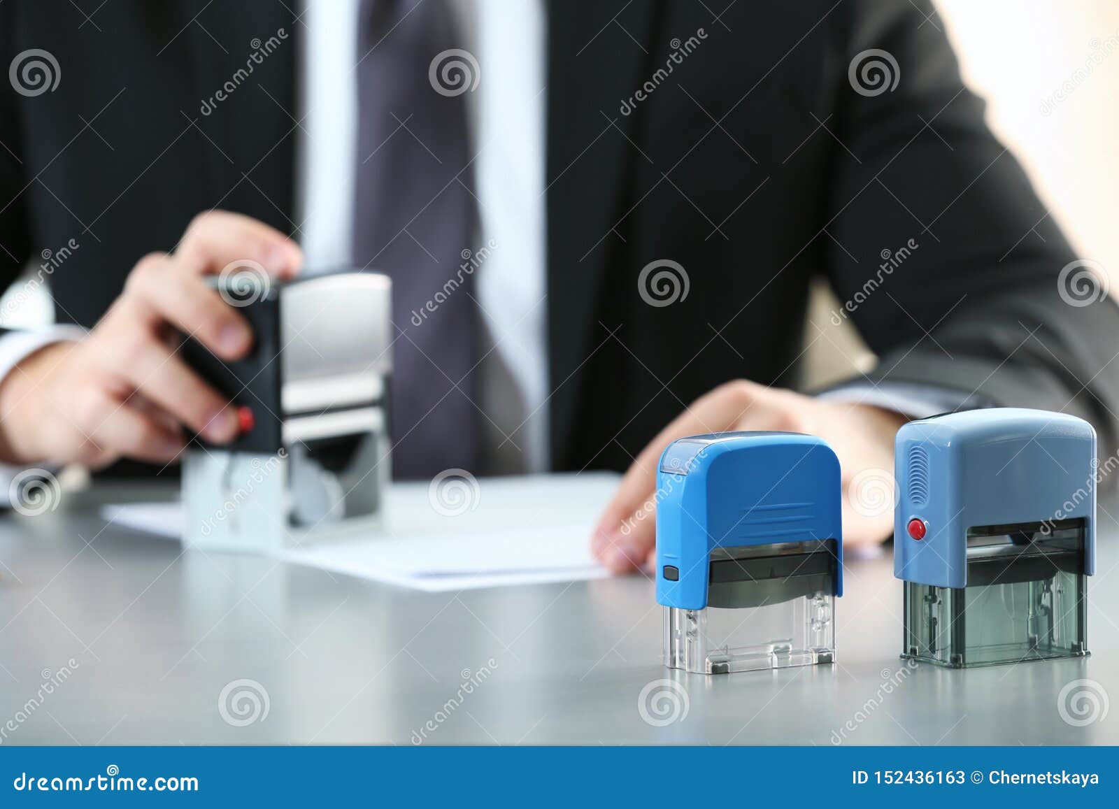 Male Notary Stamping Document at Table Stock Image - Image of counsel ...