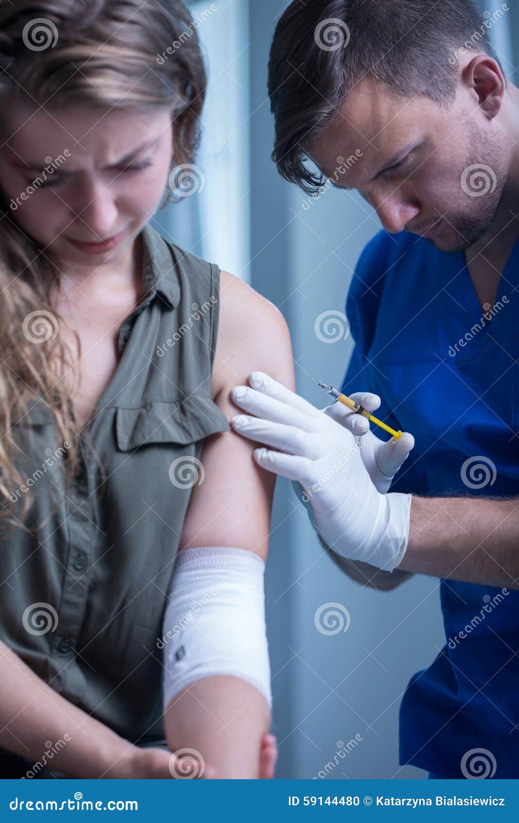 Male Nurse Doing an Injection Stock Photo - Image of glove, healthcare ...
