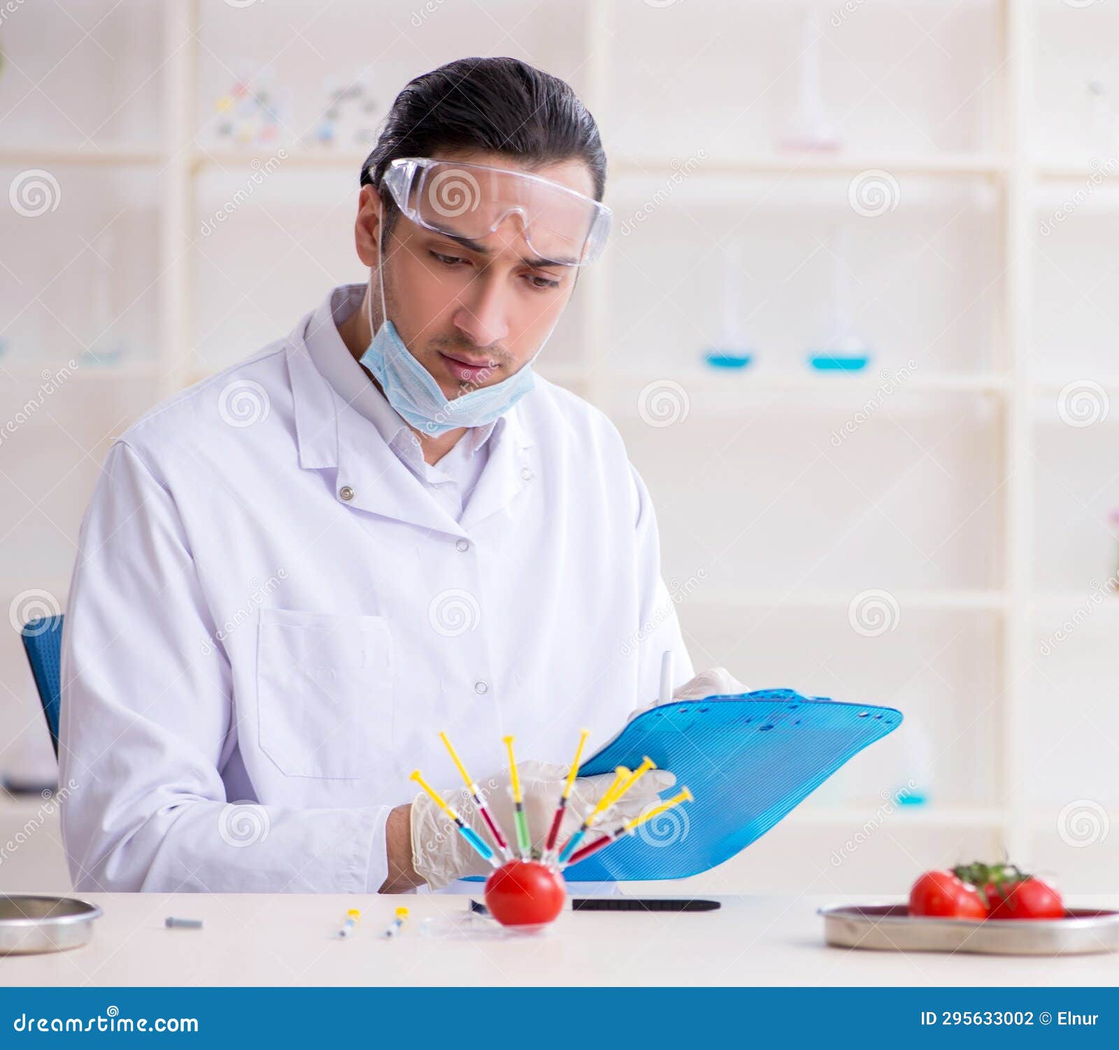 Male Nutrition Expert Testing Food Products in Lab Stock Photo - Image ...