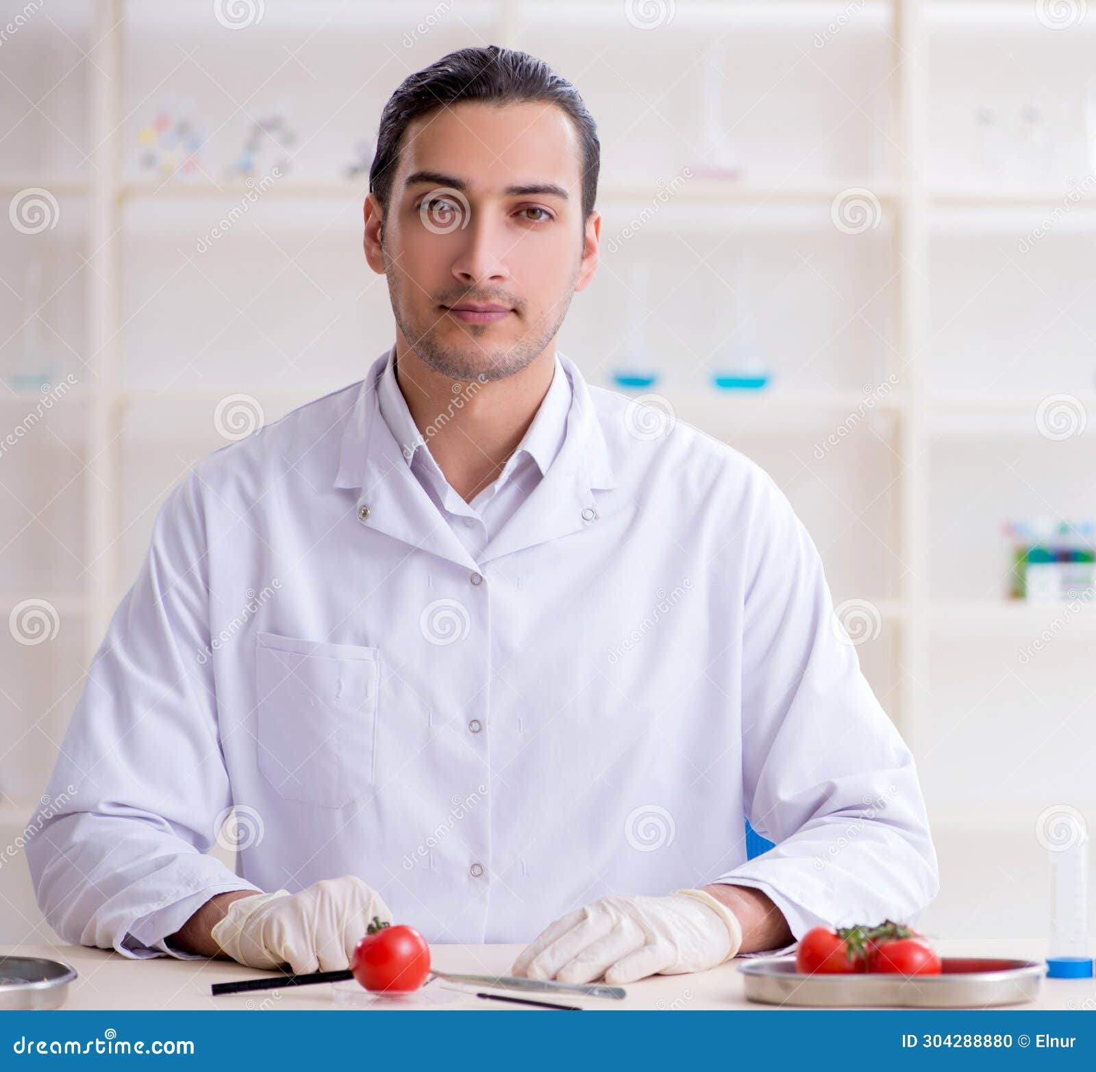 Male Nutrition Expert Testing Food Products in Lab Stock Photo - Image ...