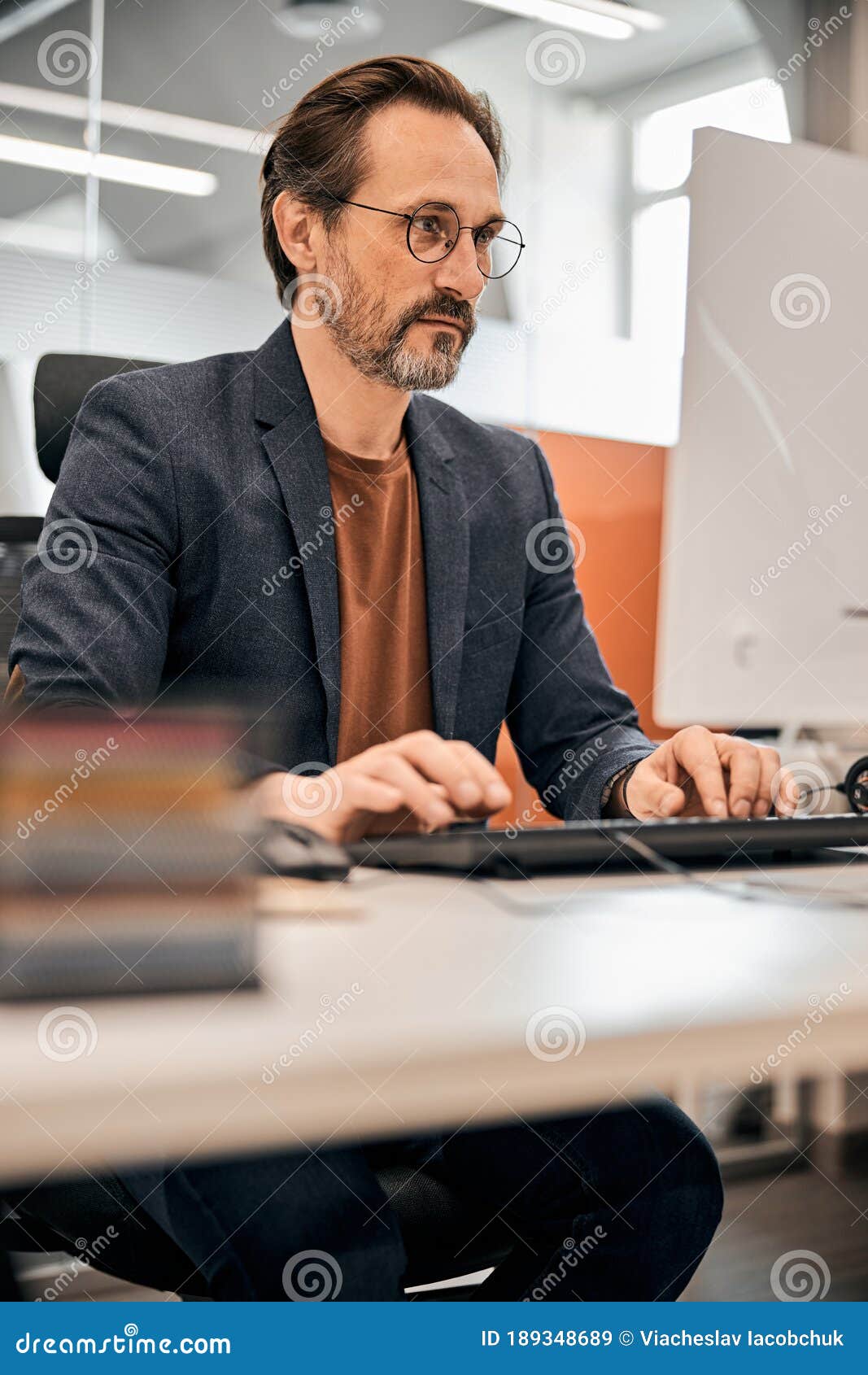 Male Office Worker Looking at Computer Screen Stock Image - Image of ...