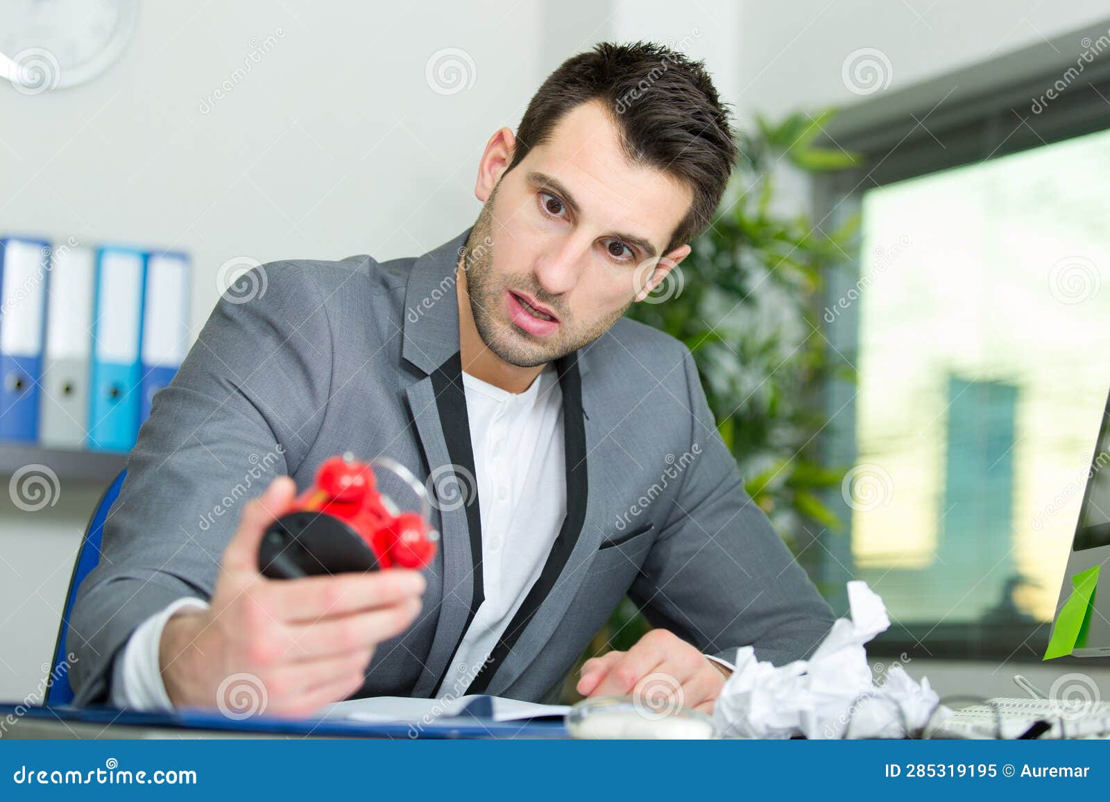 Male Office Worker Shock Expression Looking at Alarm Clock Stock Image ...