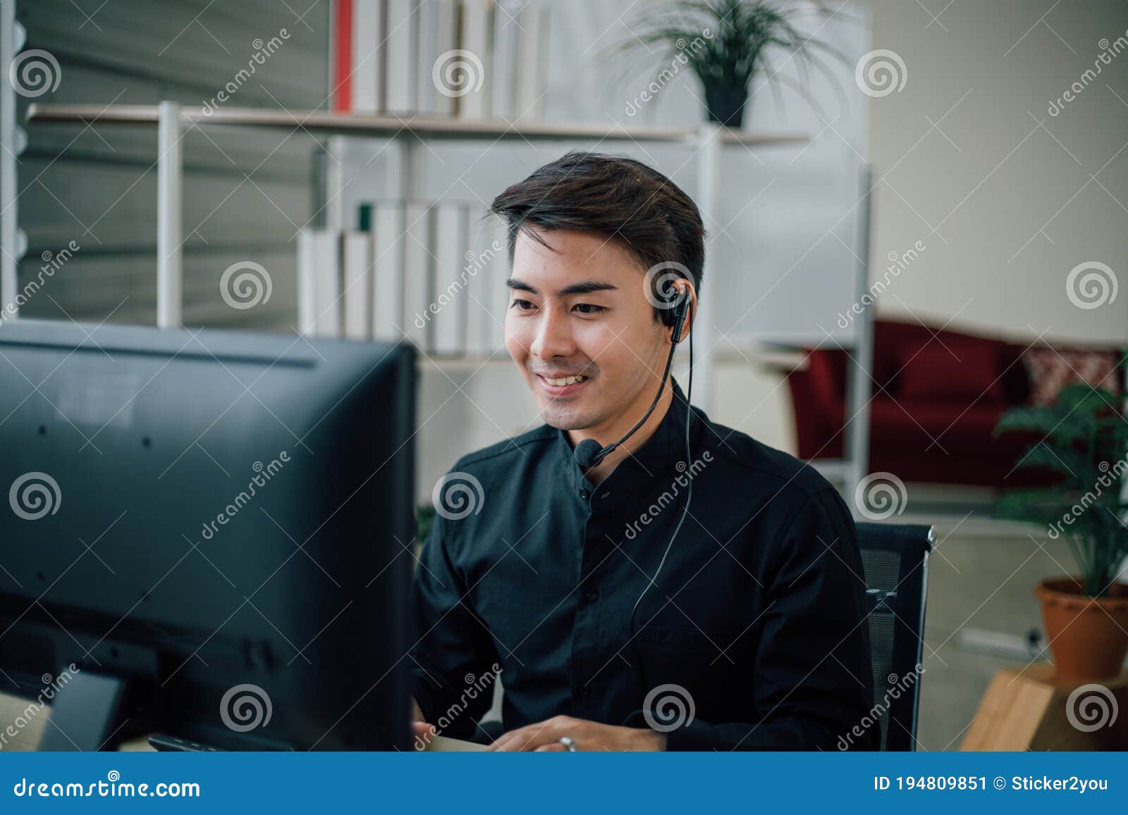 Male Officer Working and Smiling in Customer Service Office Stock Image ...