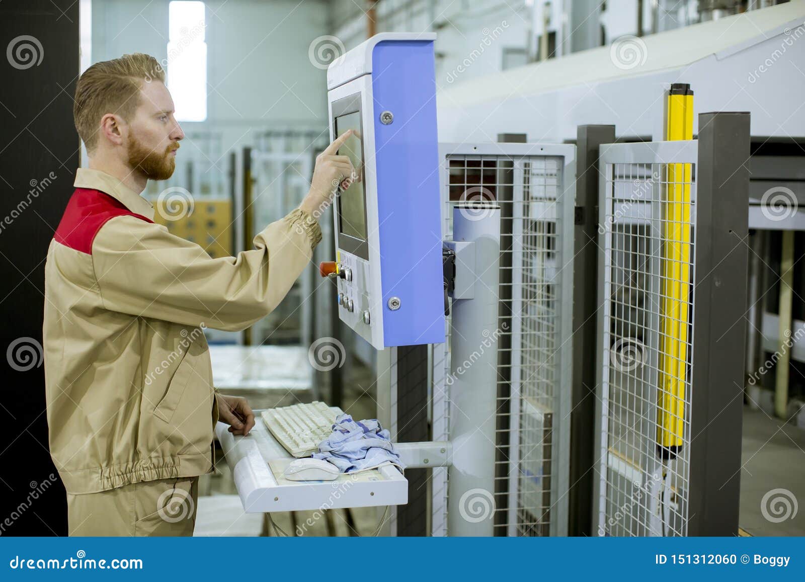 Male Operator Presses the Button on the Control Panel at the Control ...