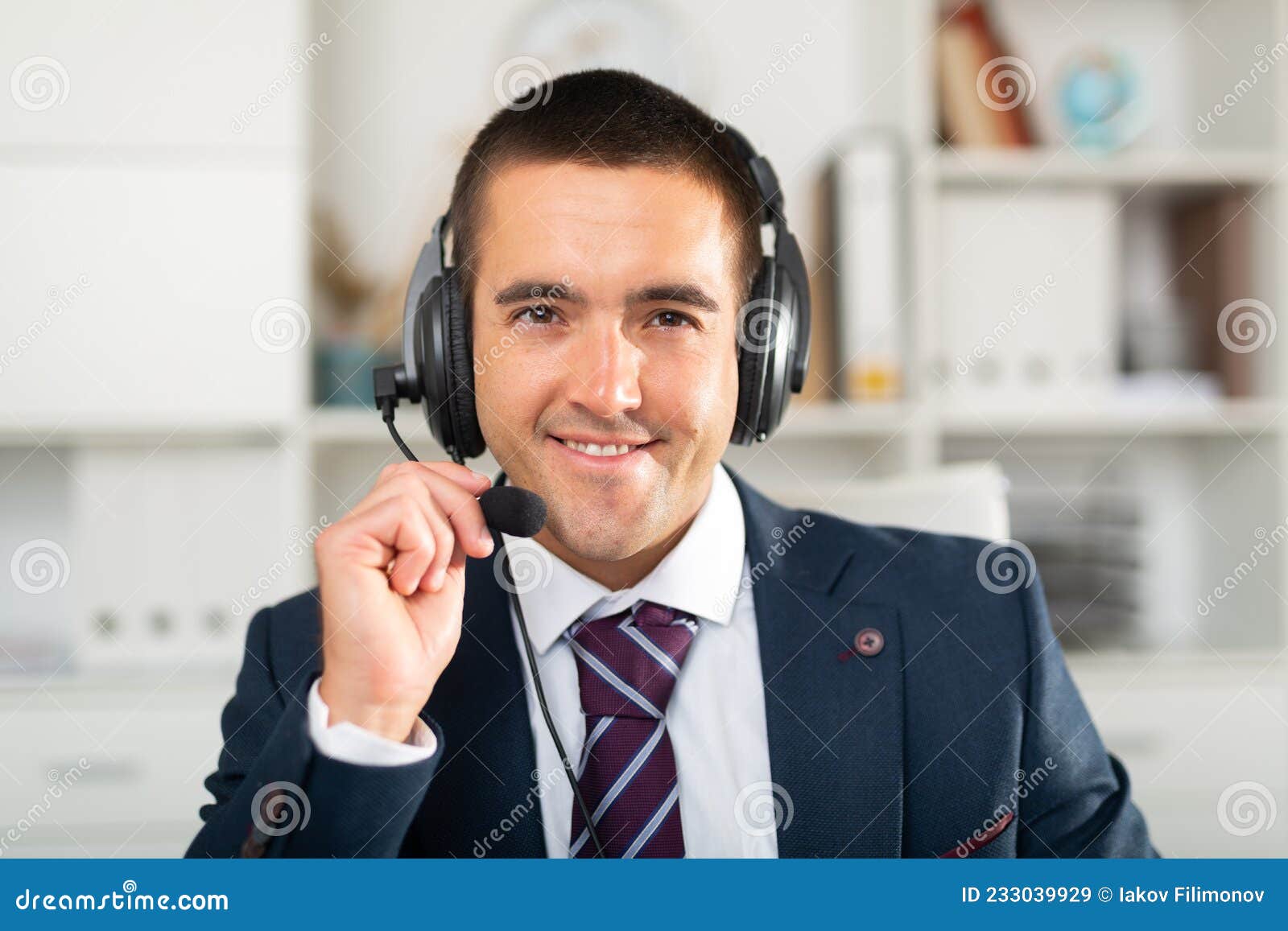 Male Operator Talking with Customer Using Headset at Office Stock Image ...
