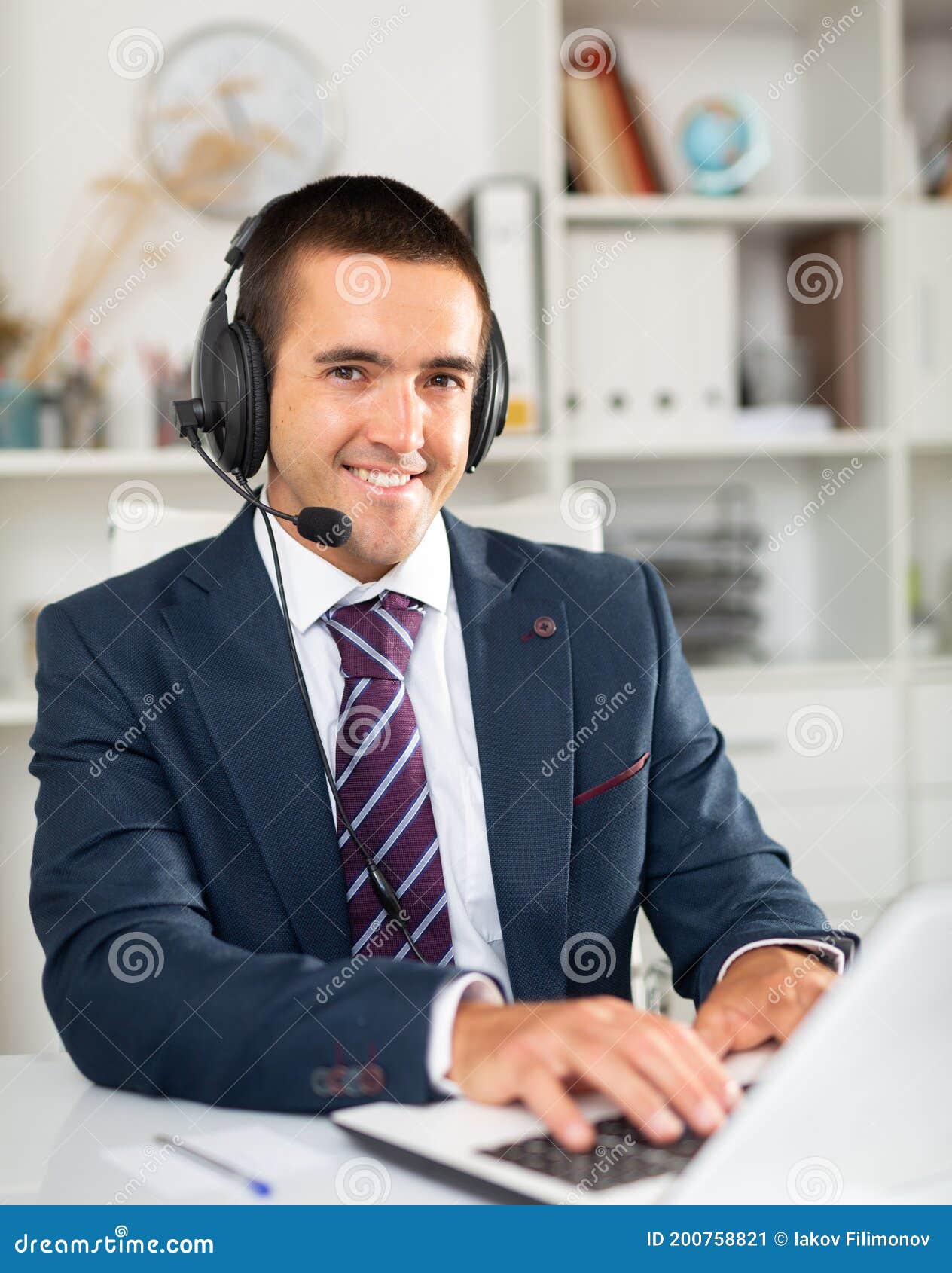 Male Operator Talking with Customer Using Headset at Office Stock Image ...