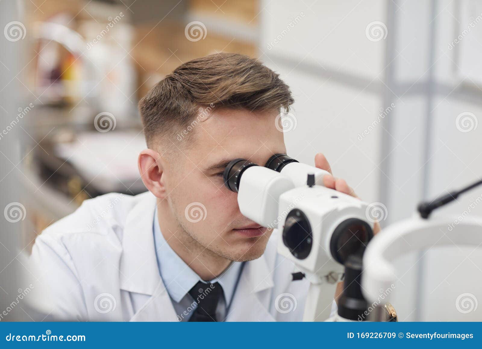Male Ophthalmologist Using Vision Test Equpment Stock Image - Image of ...