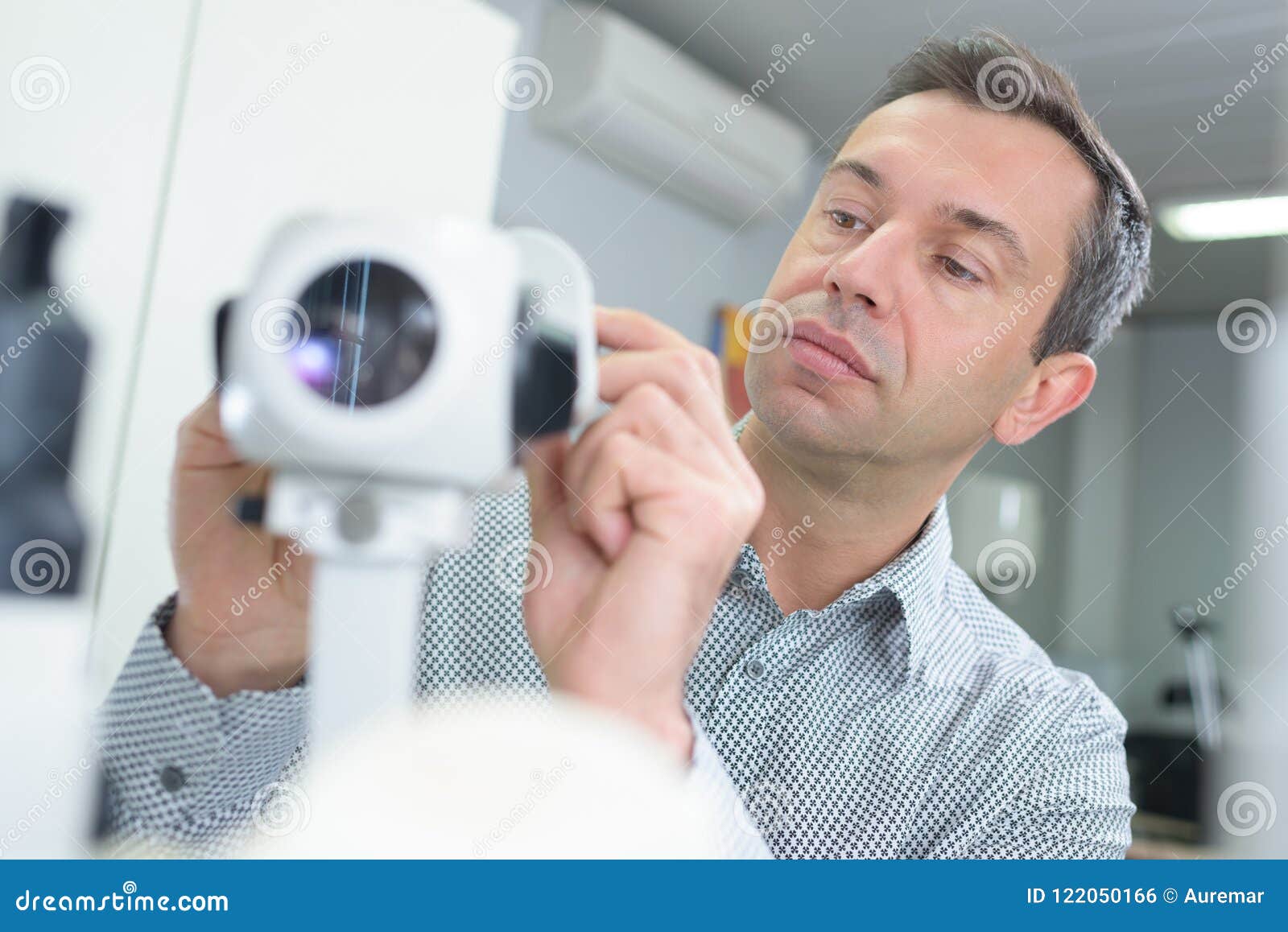 Male Optometrist with Machine Stock Photo - Image of examination ...
