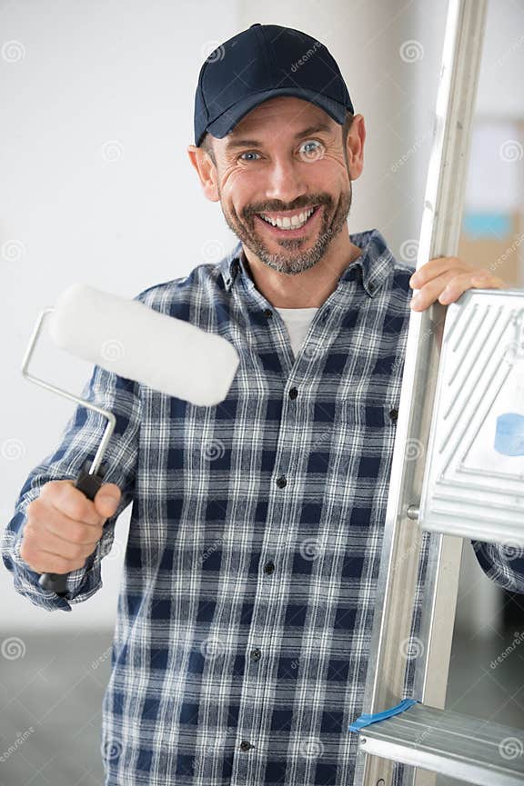 Male Painter and Decorator with Stepladder and Roller Stock Photo ...