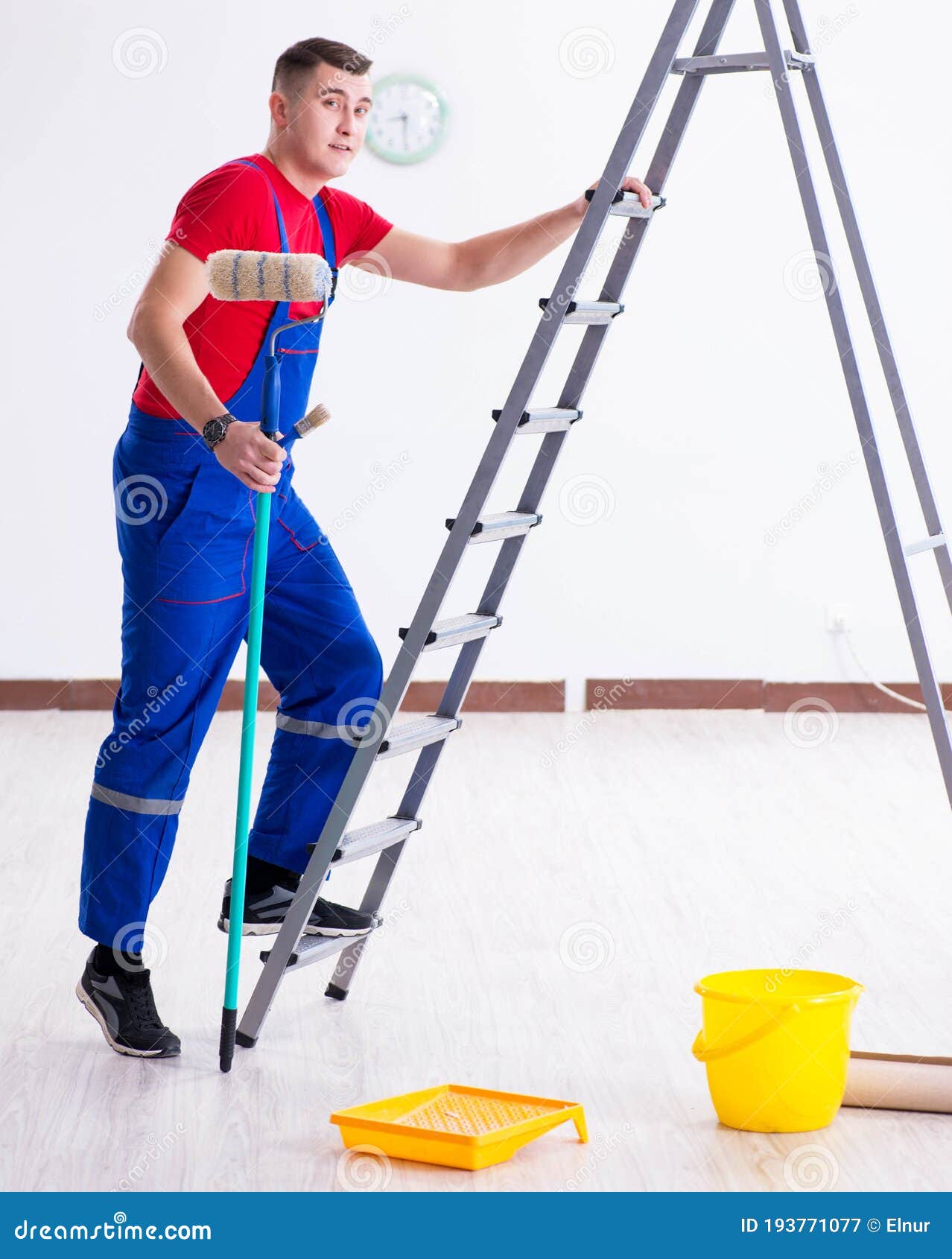 Male Painter Preparing for Painting Job at Construction Site Stock ...