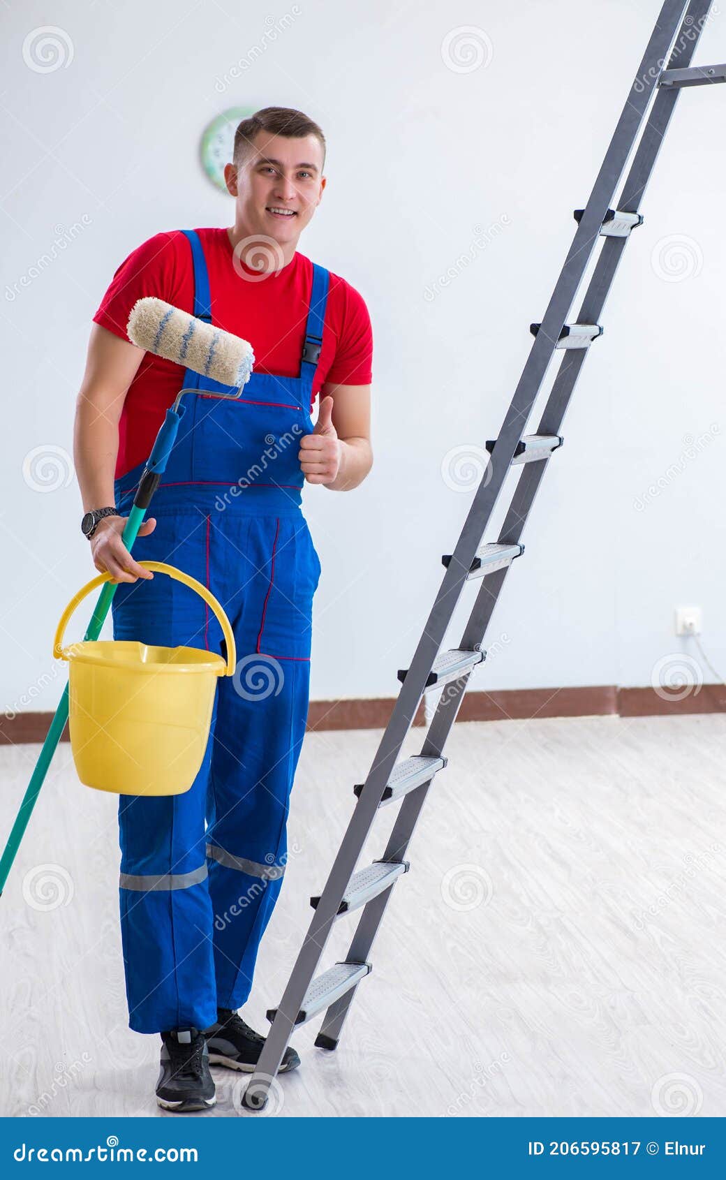 Male Painter Preparing for Painting Job at Construction Site Stock ...